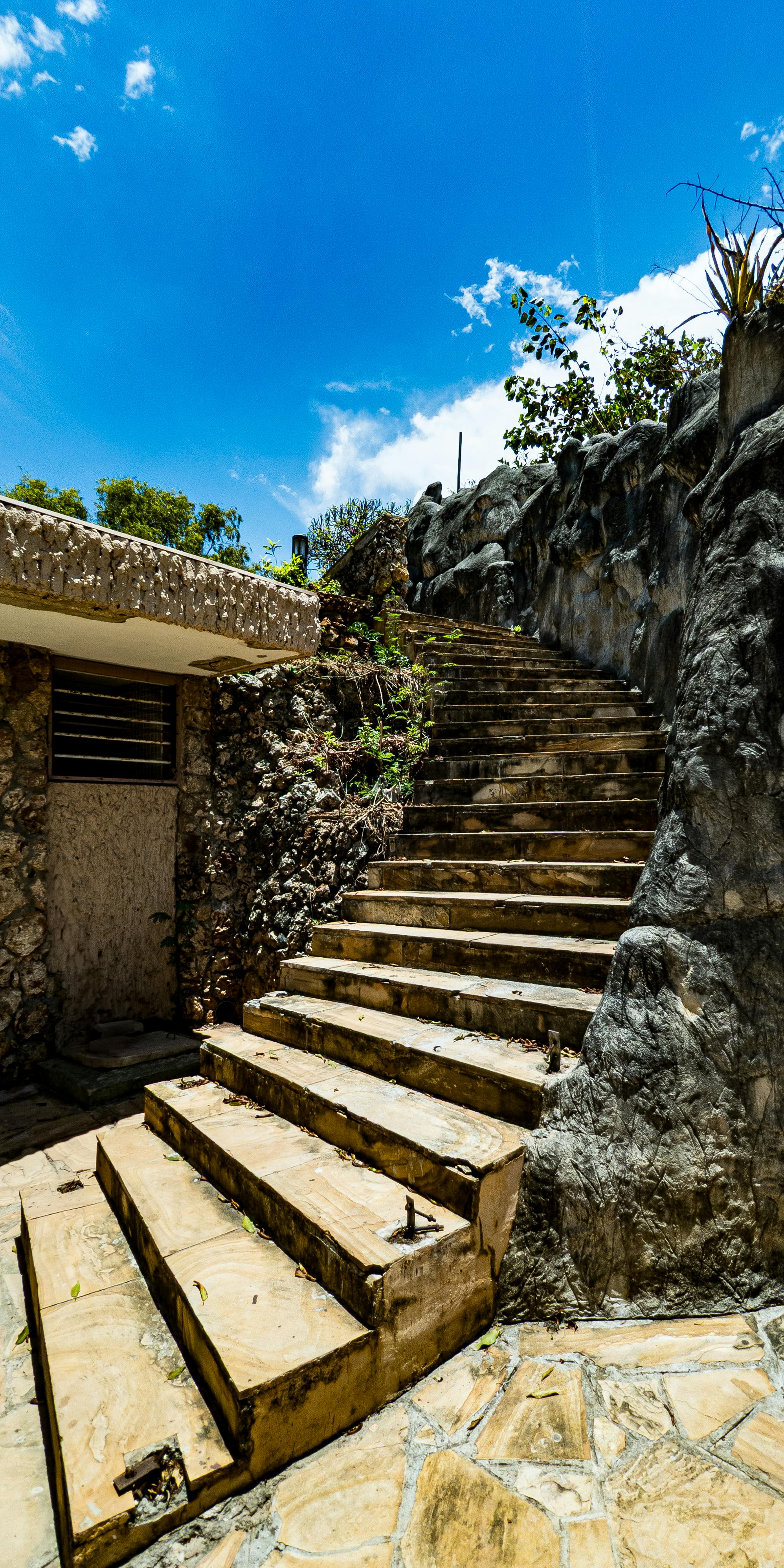Rustic Stone Staircase Against Blue Sky · Free Stock Photo