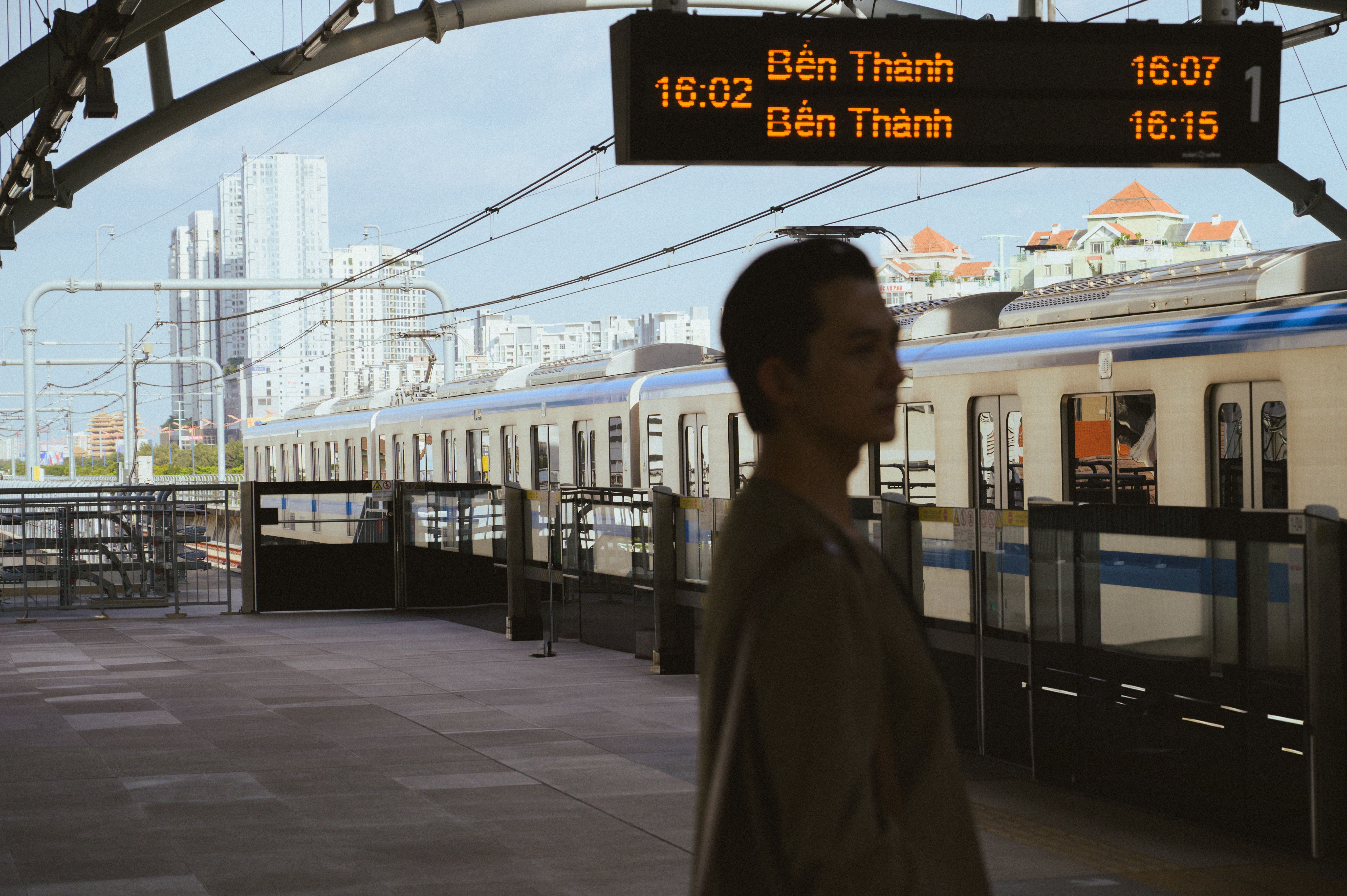 Modern city train station with urban scene · Free Stock Photo