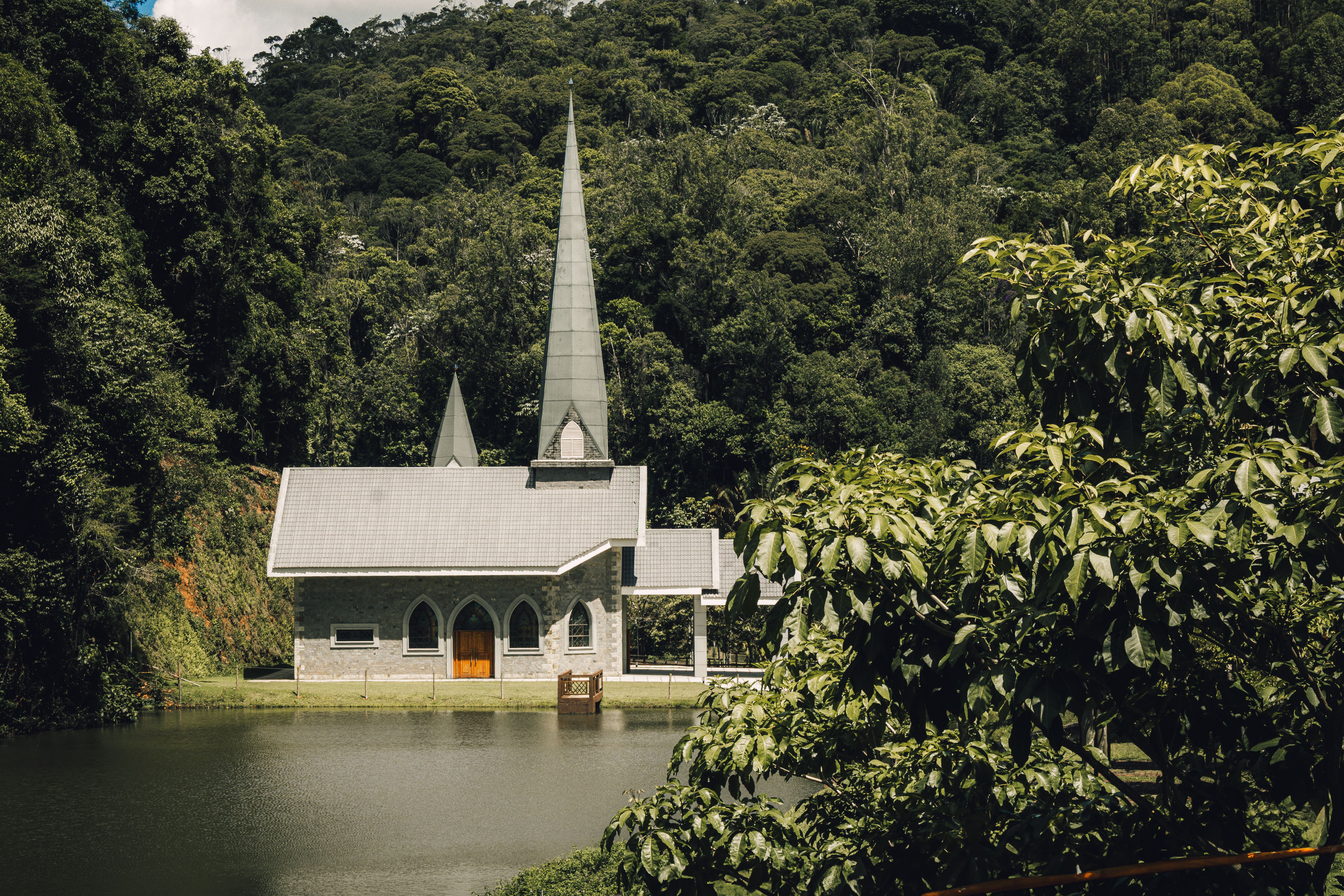 Picturesque Stone Church in Forest Setting · Free Stock Photo
