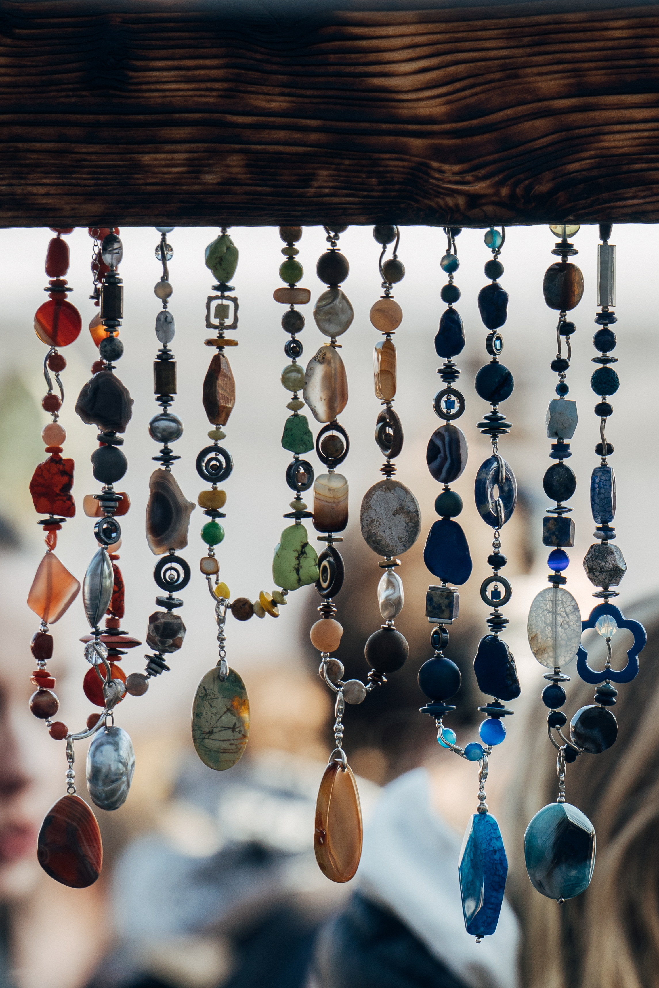 Colorful Handmade Gemstone Necklaces on Display · Free Stock Photo