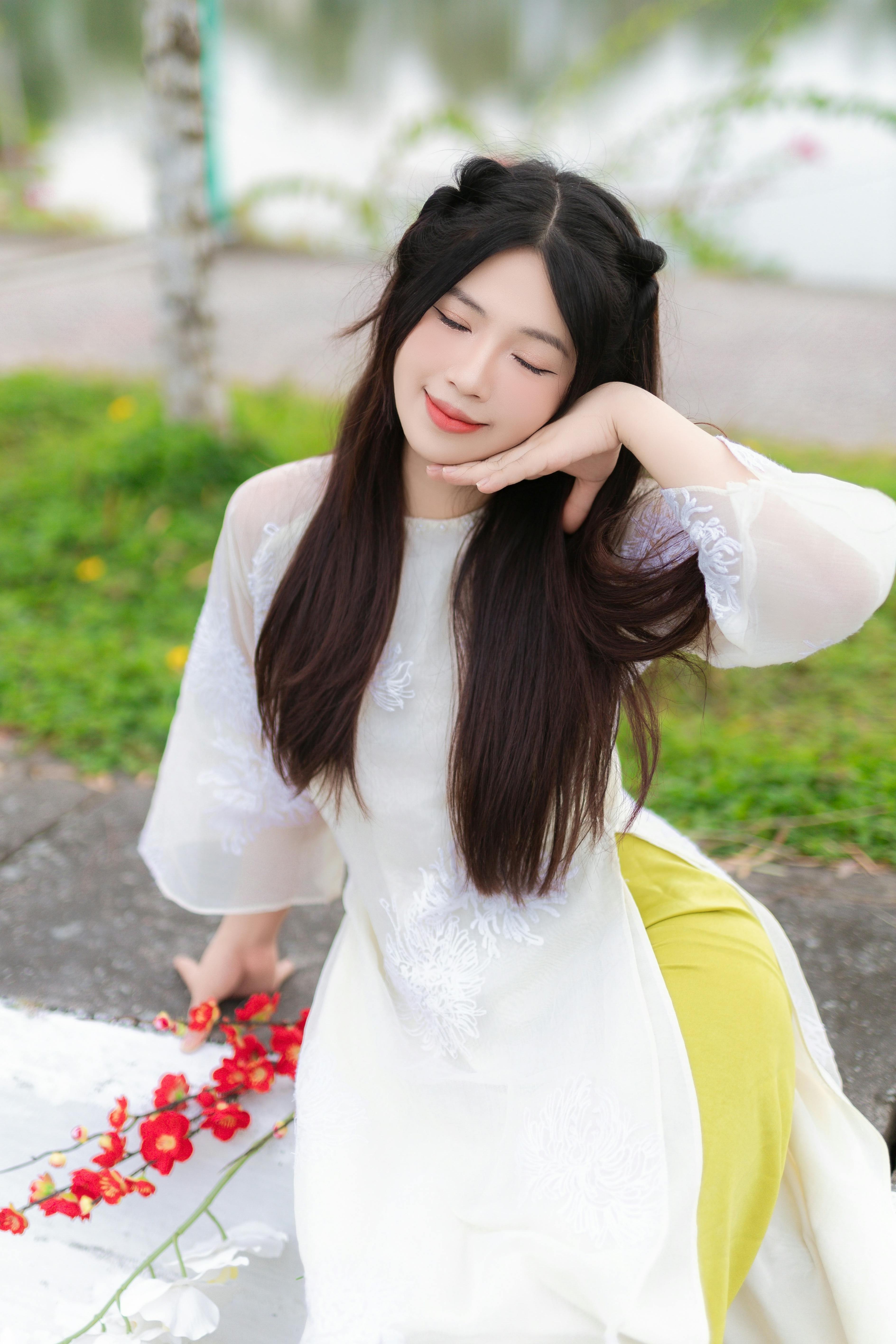 Peaceful Portrait of a Woman in Traditional Dress Outdoors · Free Stock ...
