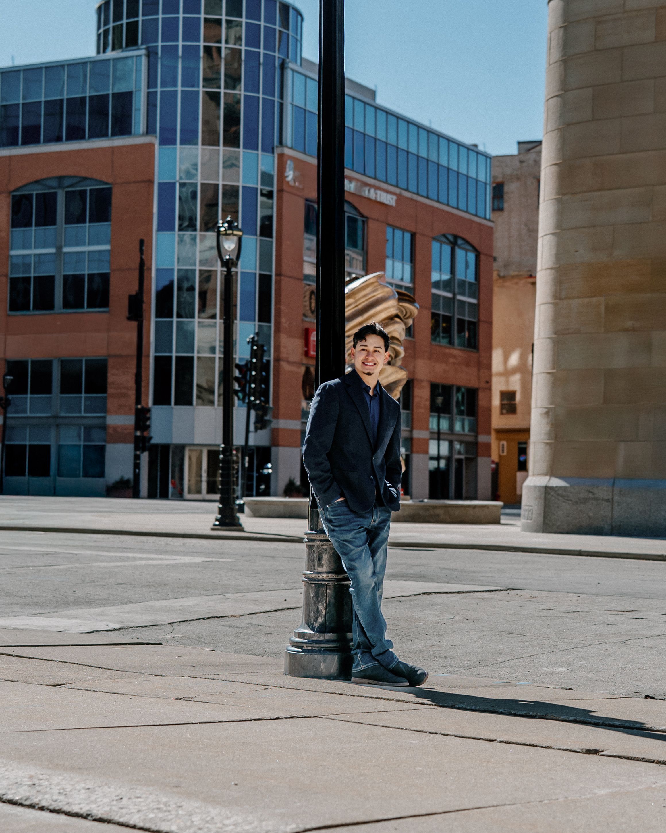 Confident Man Relaxing in Urban Cityscape · Free Stock Photo