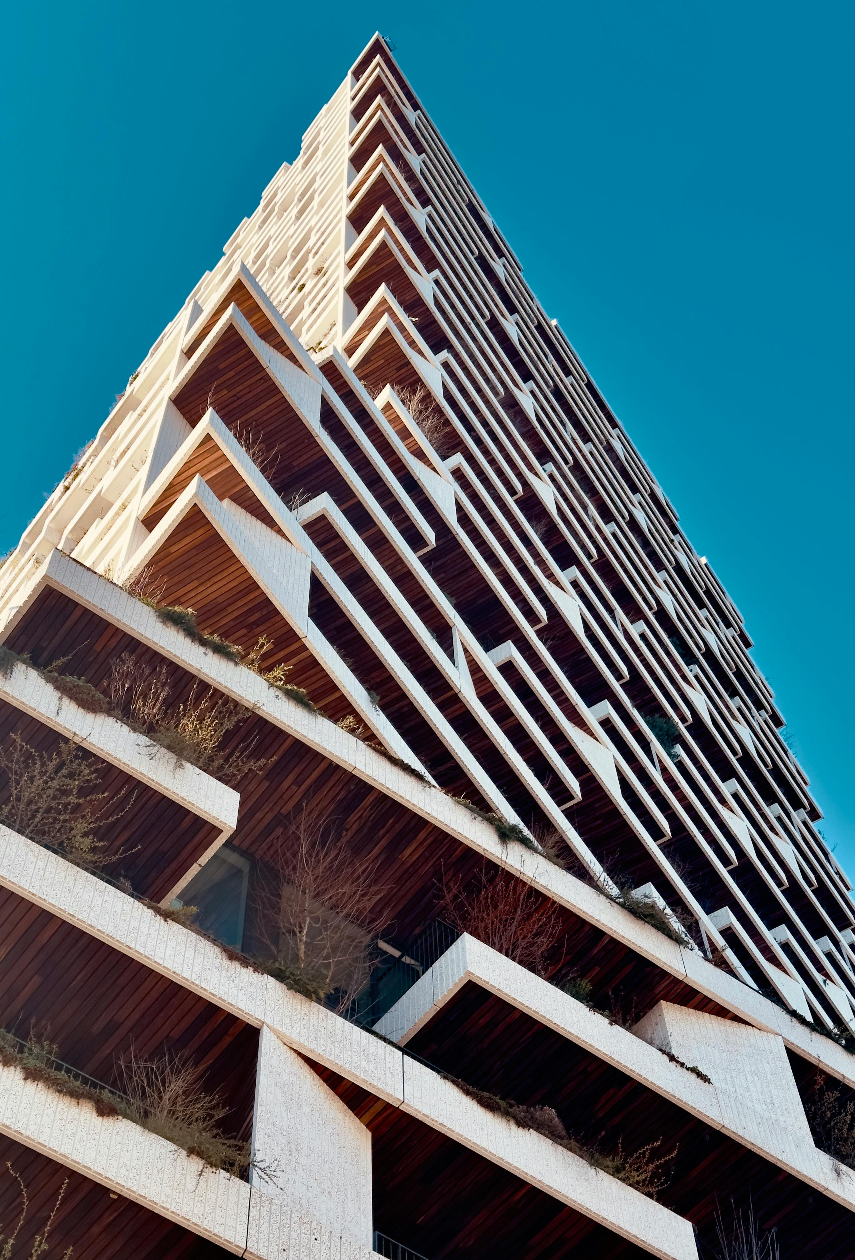 Modern Geometric Apartment Building Facade · Free Stock Photo