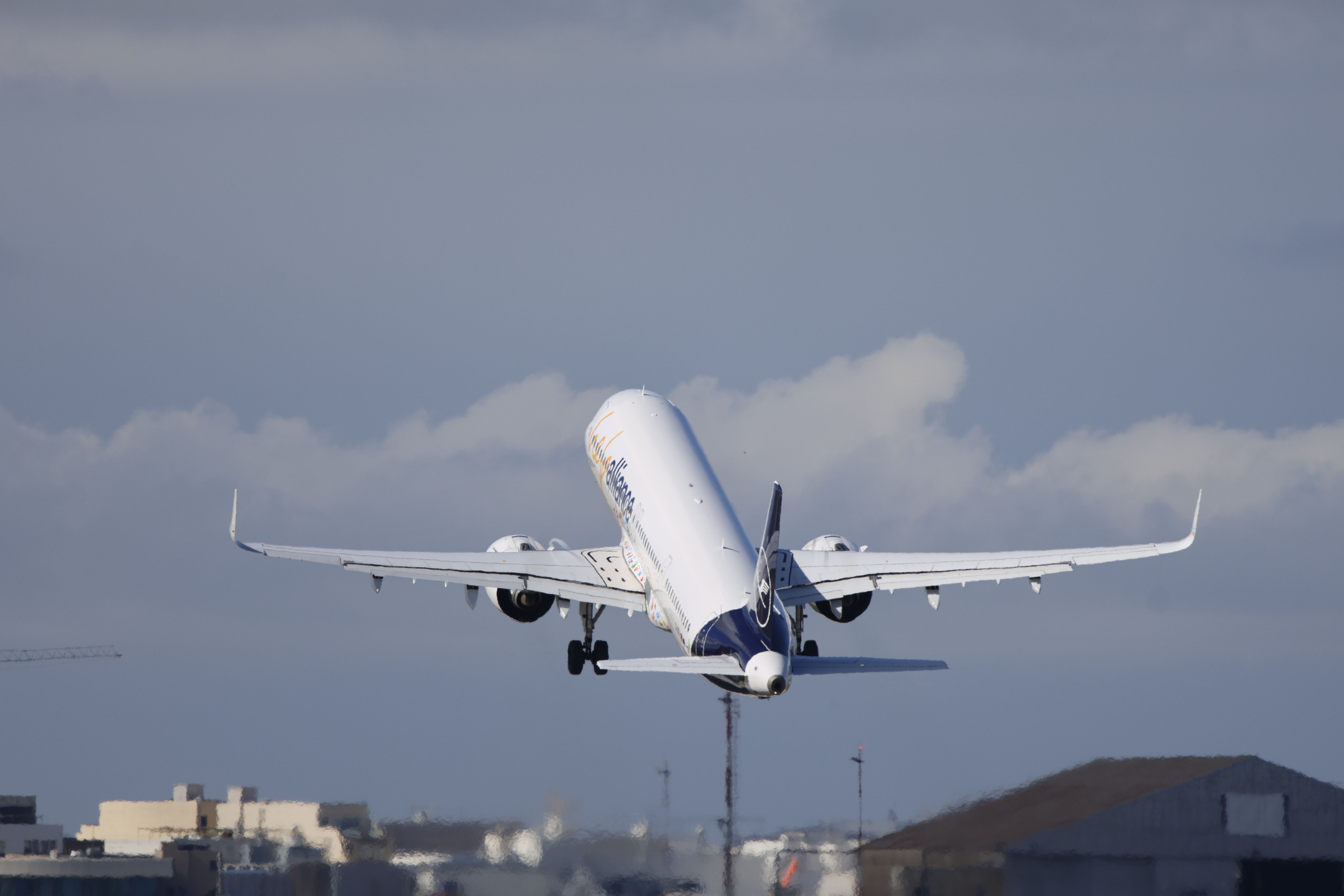 Commercial Airplane Taking Off Into Clear Sky · Free Stock Photo