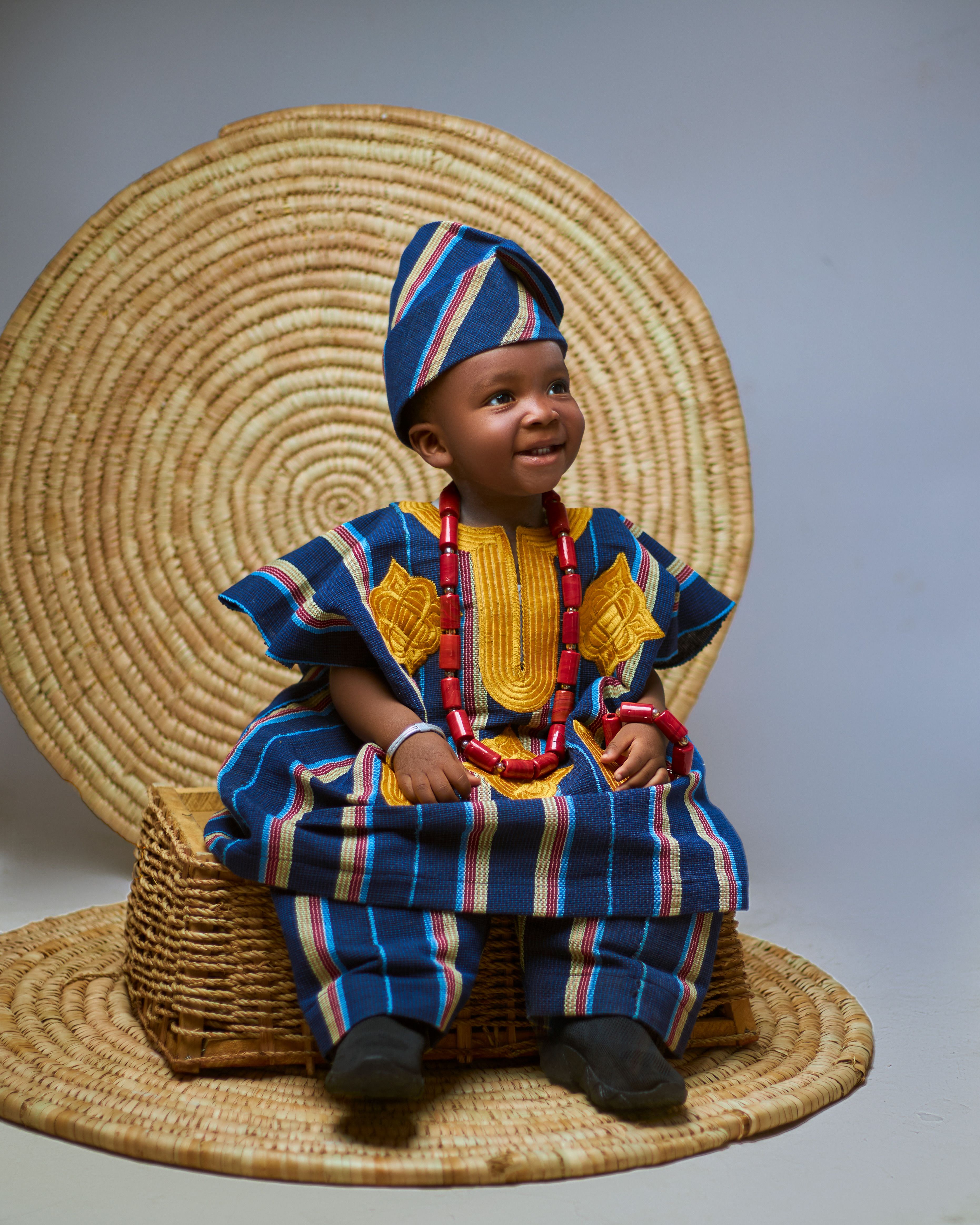 Smiling Child in Traditional Yoruba Attire · Free Stock Photo