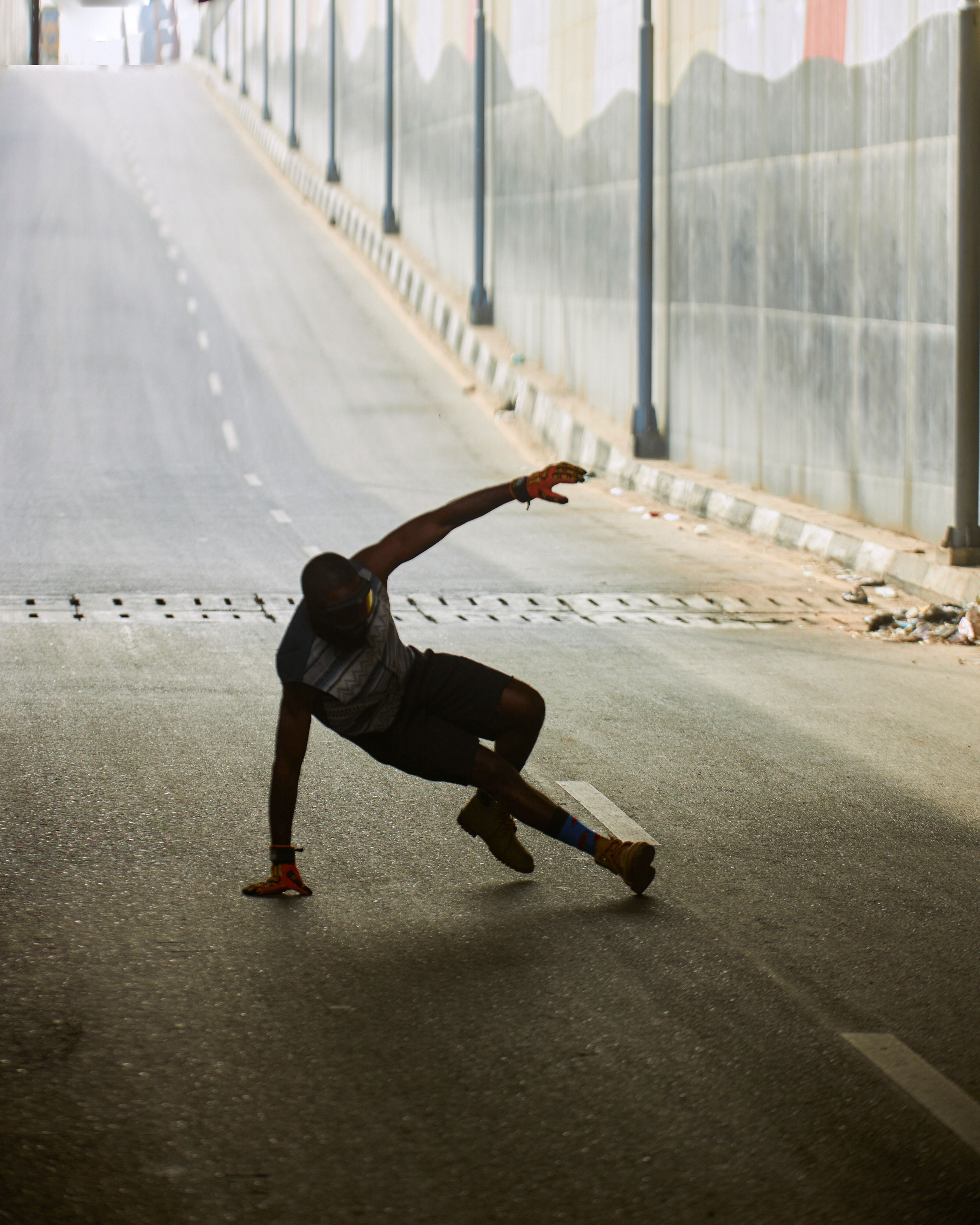 Man Sliding on Skateboard in Urban Tunnel · Free Stock Photo
