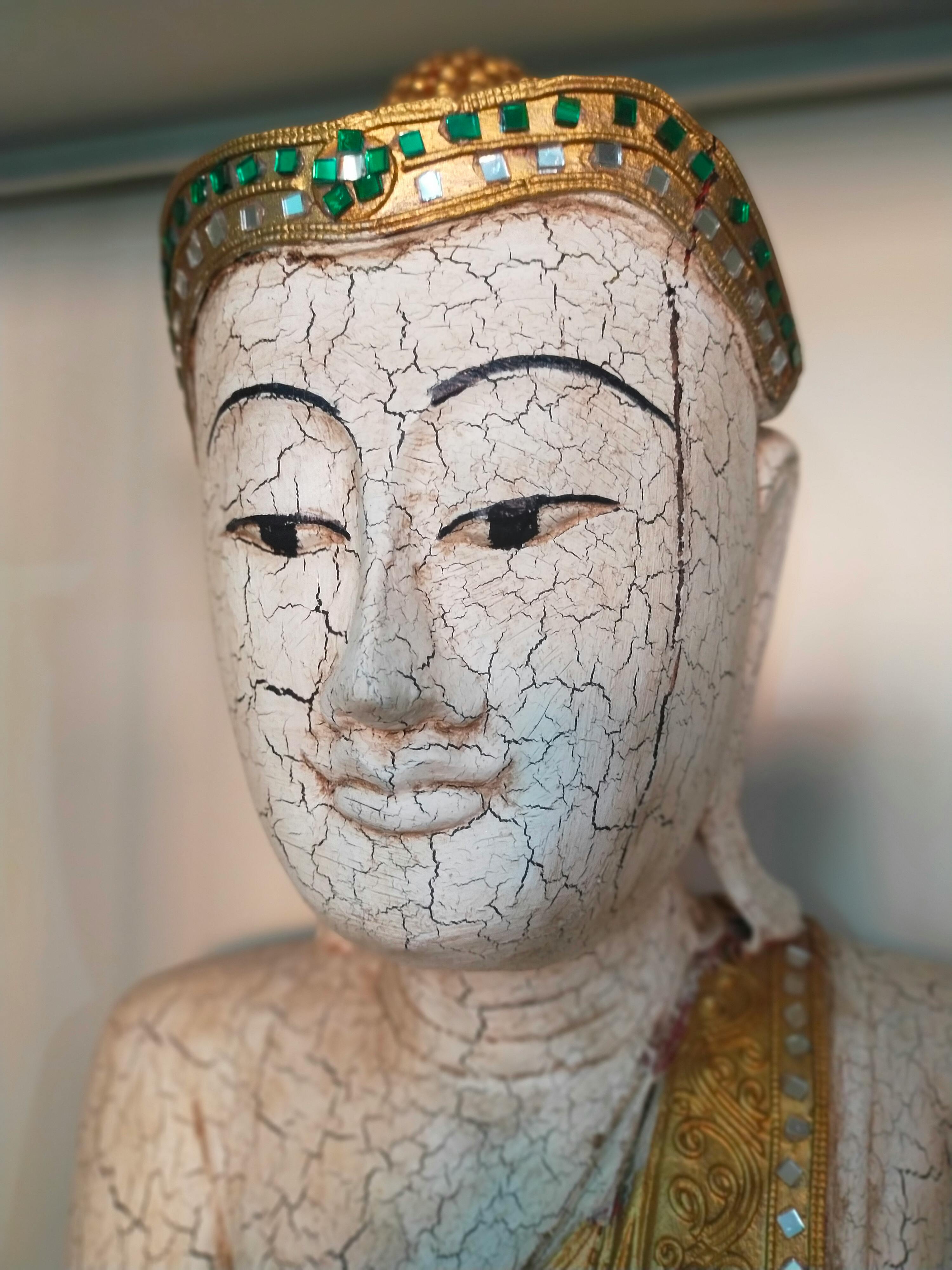 Close-up of Ancient Buddha Statue with Cracking Detail · Free Stock Photo