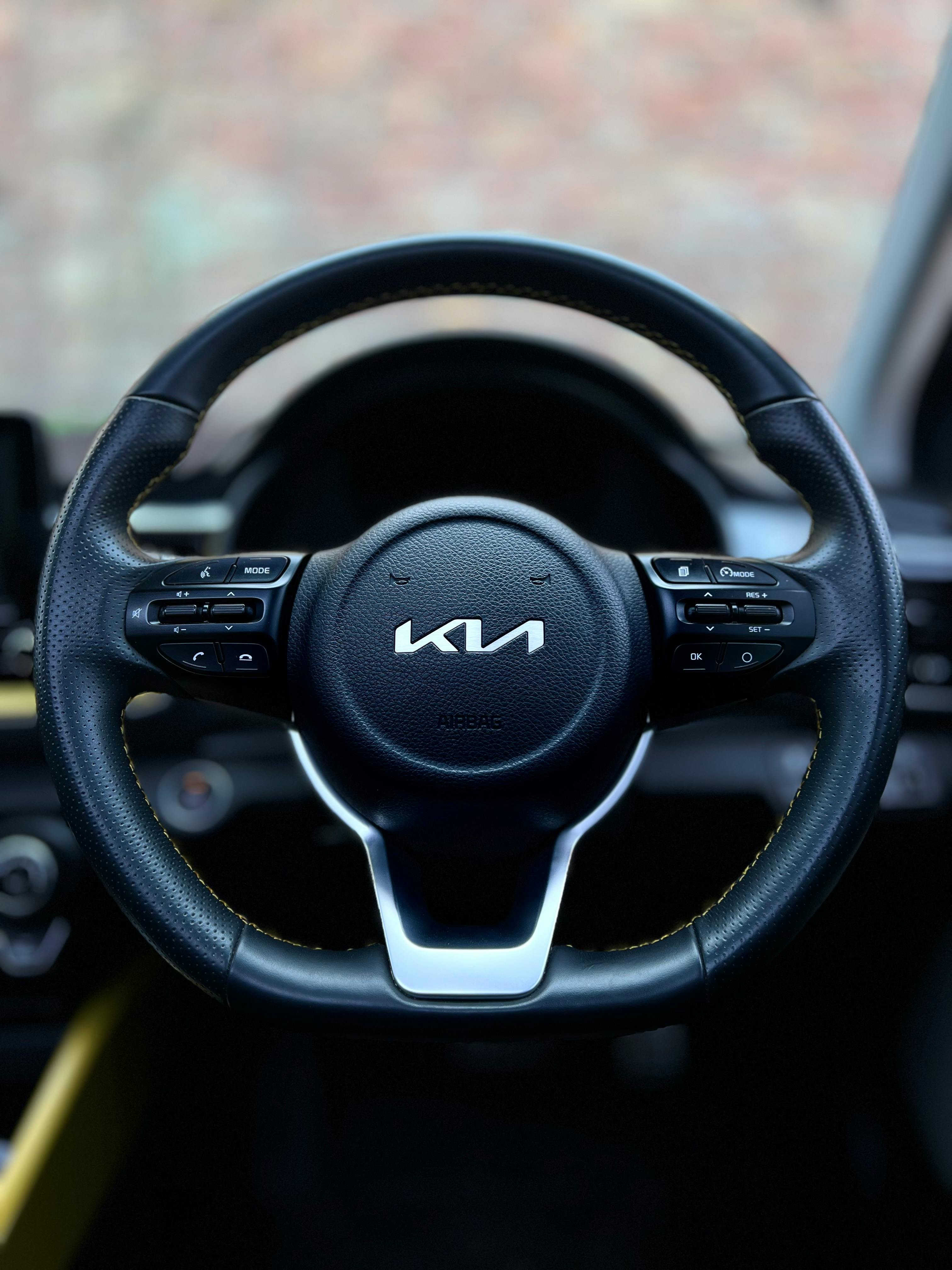 Modern Car Steering Wheel with Integrated Controls · Free Stock Photo