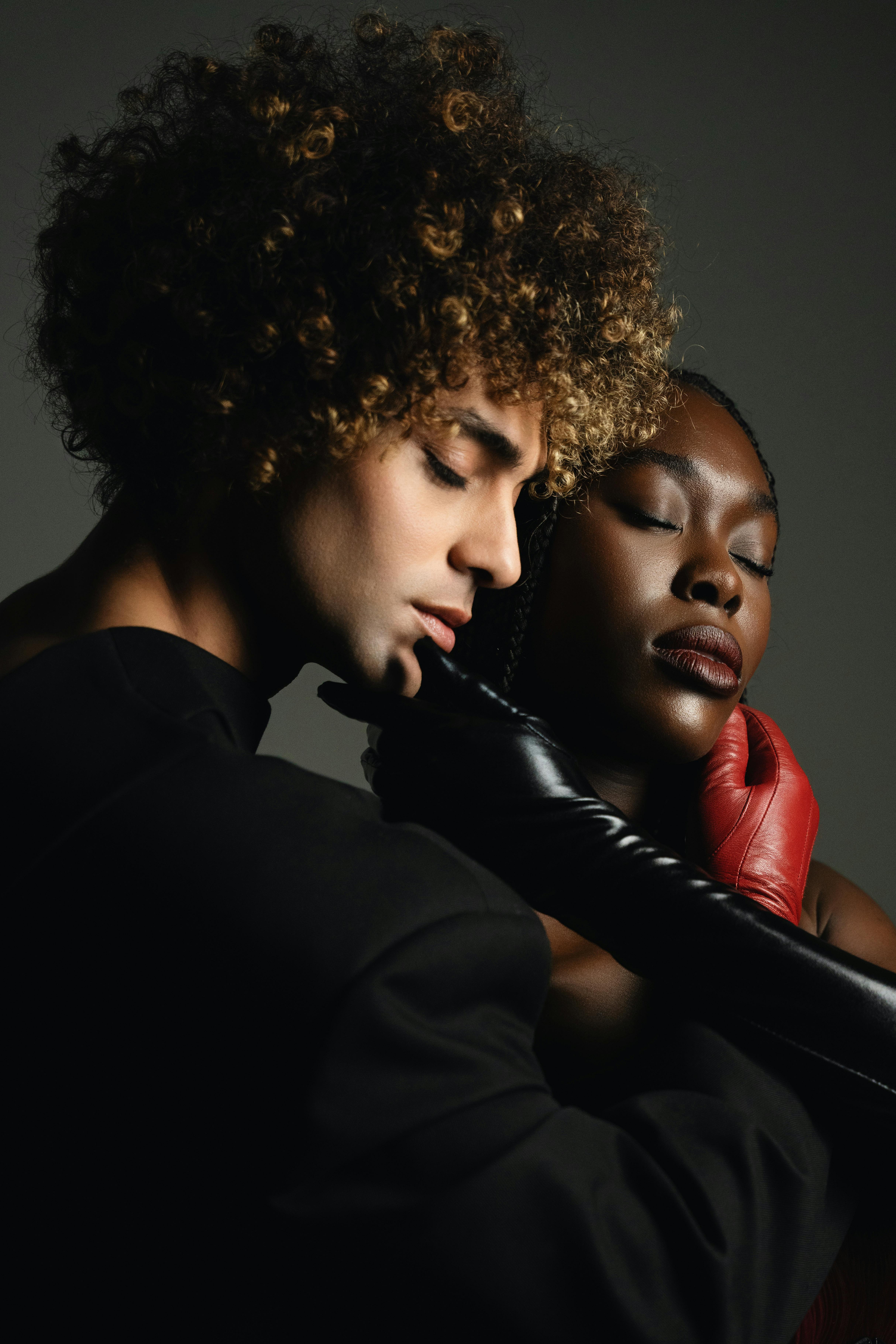 Elegant Dual Portrait with Dramatic Lighting · Free Stock Photo