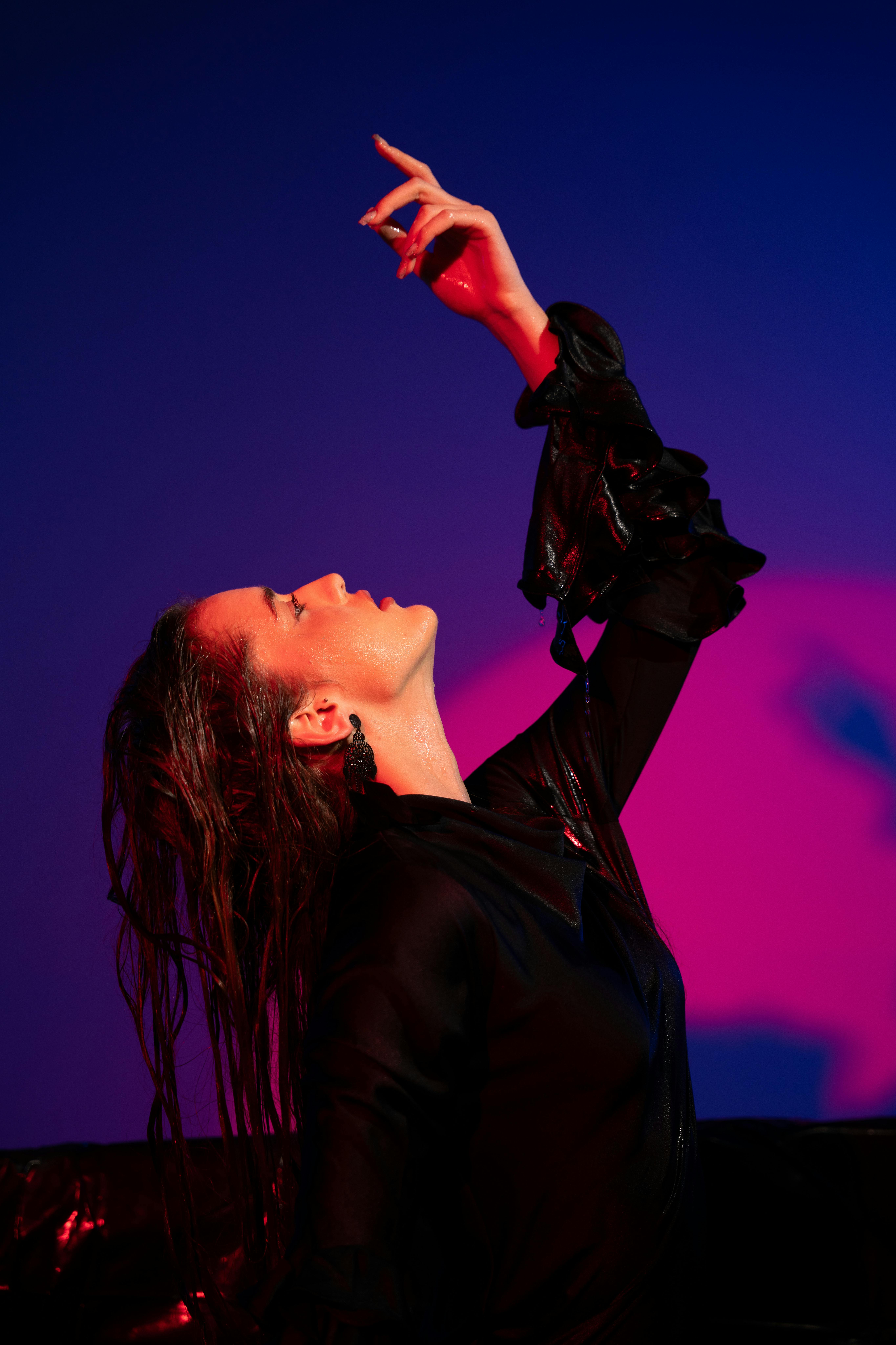 Dramatic Fashion Portrait with Vibrant Lighting · Free Stock Photo