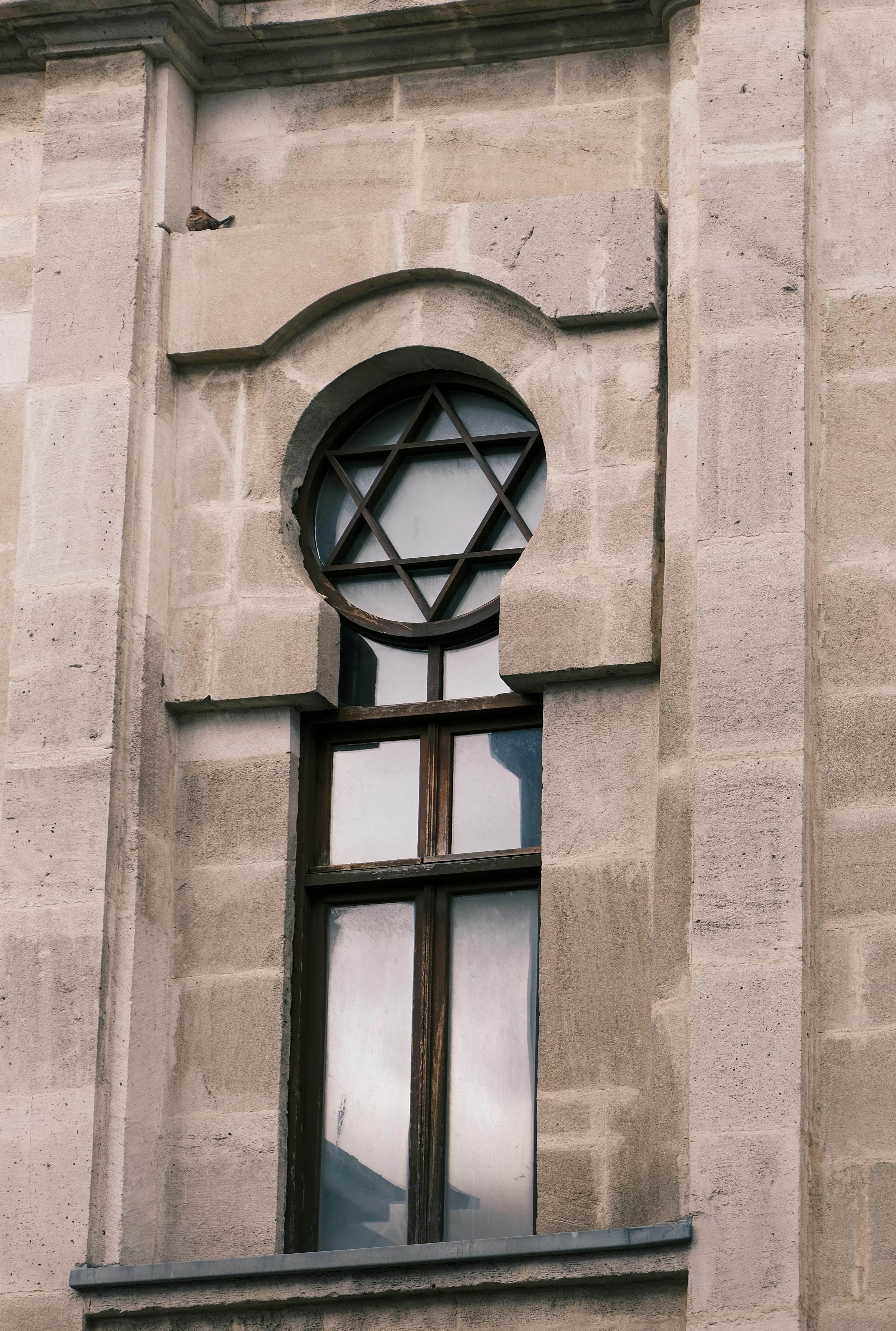 Historic Building Window with Star of David Design · Free Stock Photo