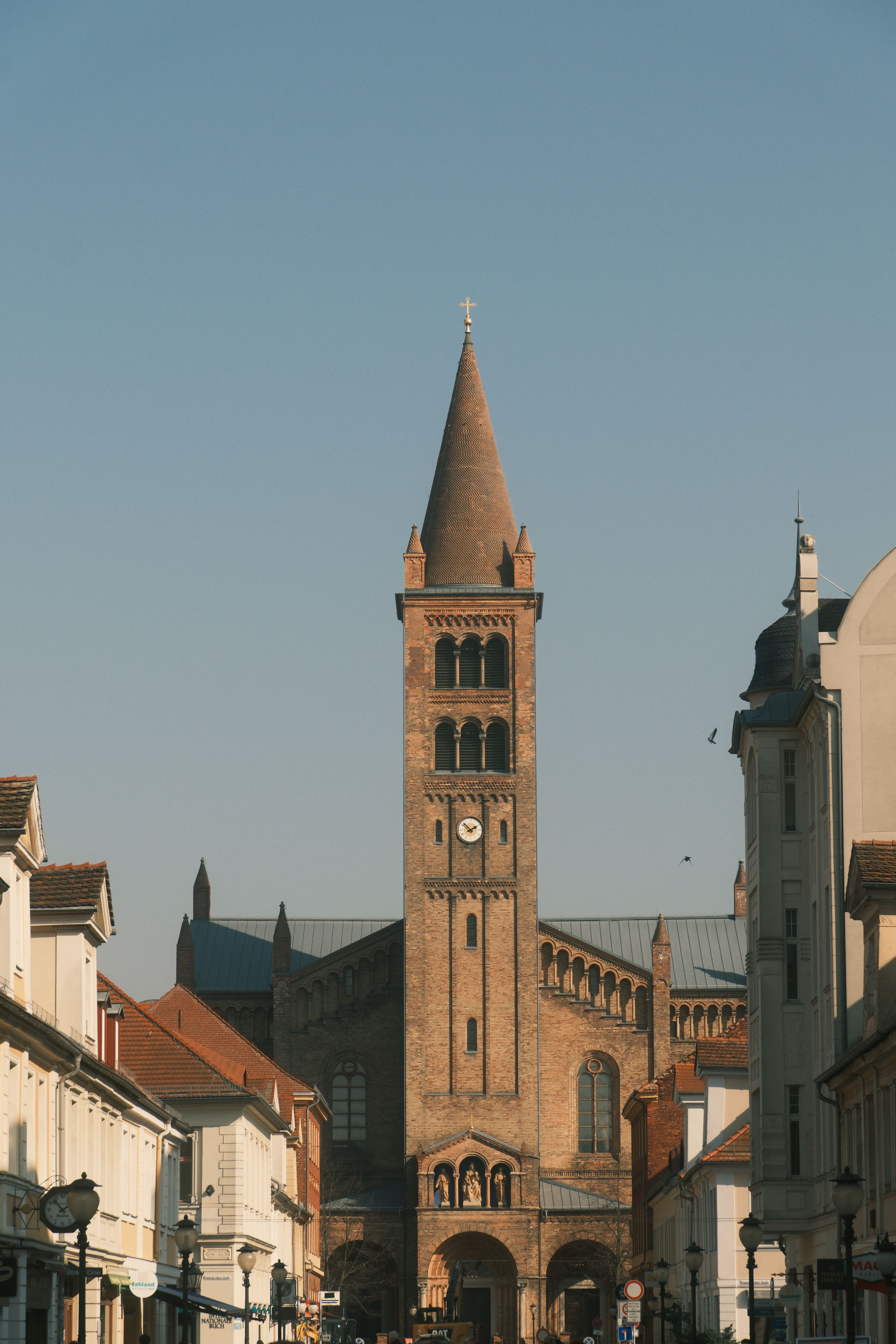 Charming European Church with Brick Facade · Free Stock Photo