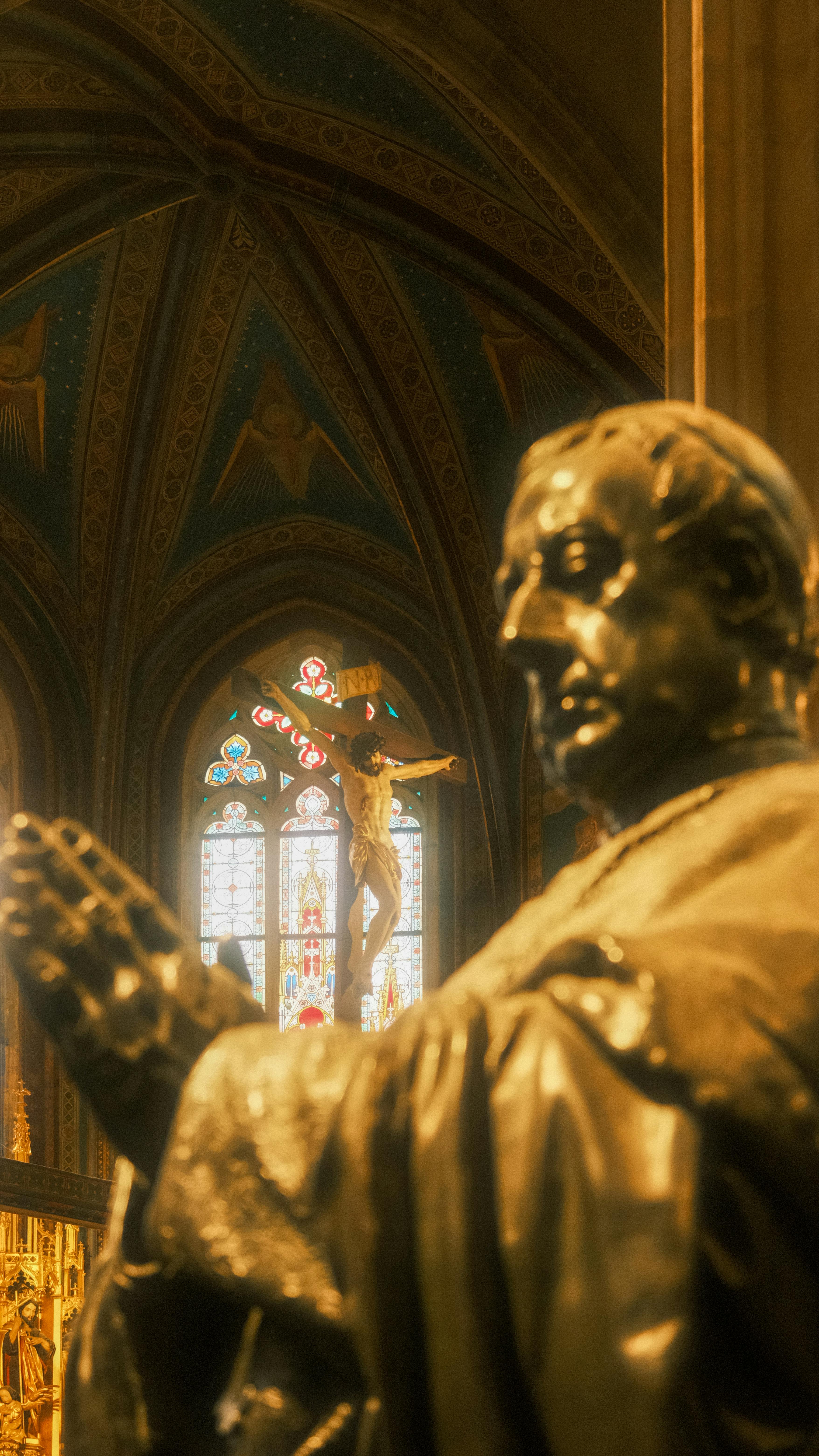 Historic Church Interior with Statue and Stained Glass · Free Stock Photo