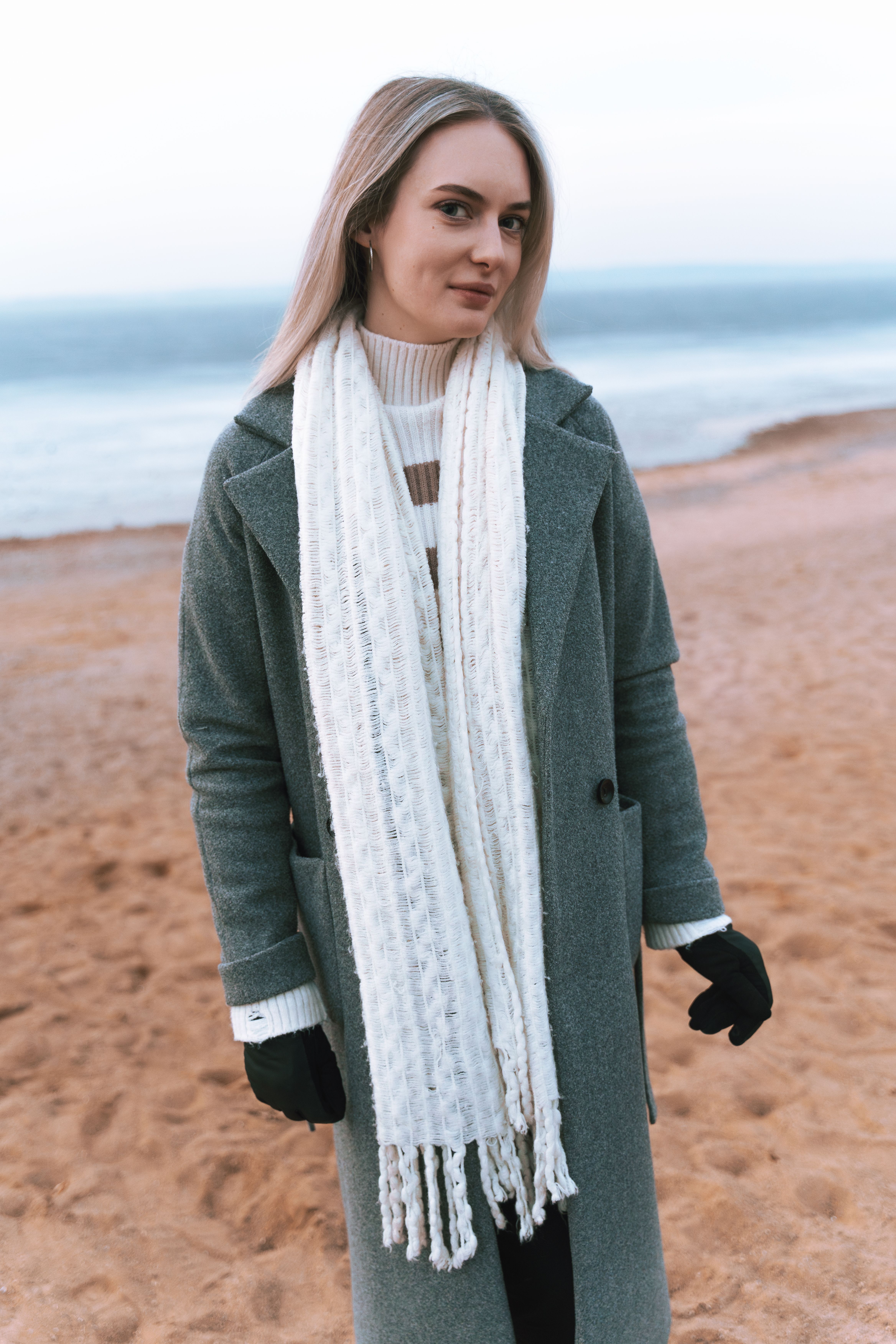 Woman in Winter Coat by the Beach · Free Stock Photo