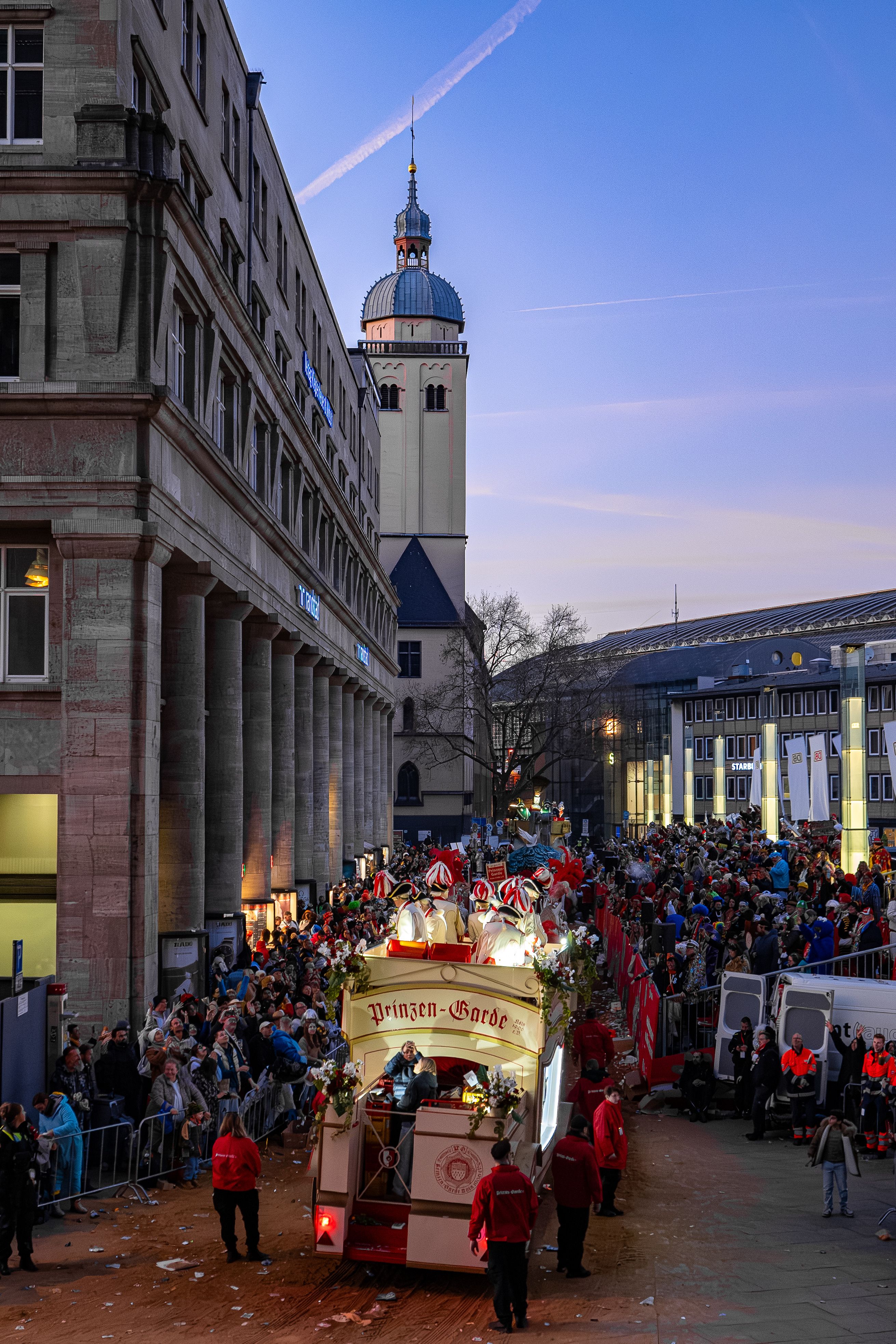 Vibrant Cologne Carnival Parade at Dusk · Free Stock Photo
