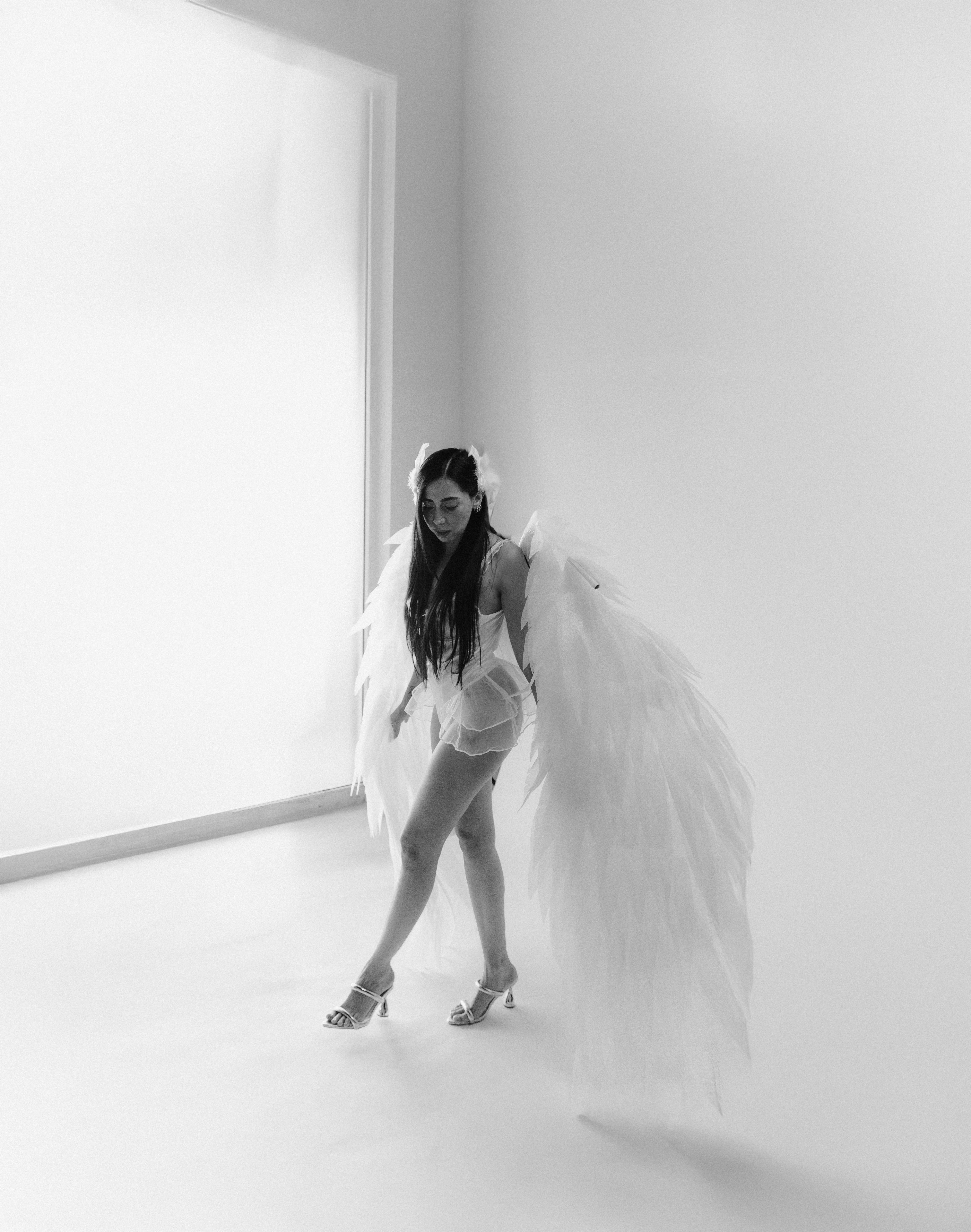 Graceful Woman in Angelic Costume with Wings · Free Stock Photo
