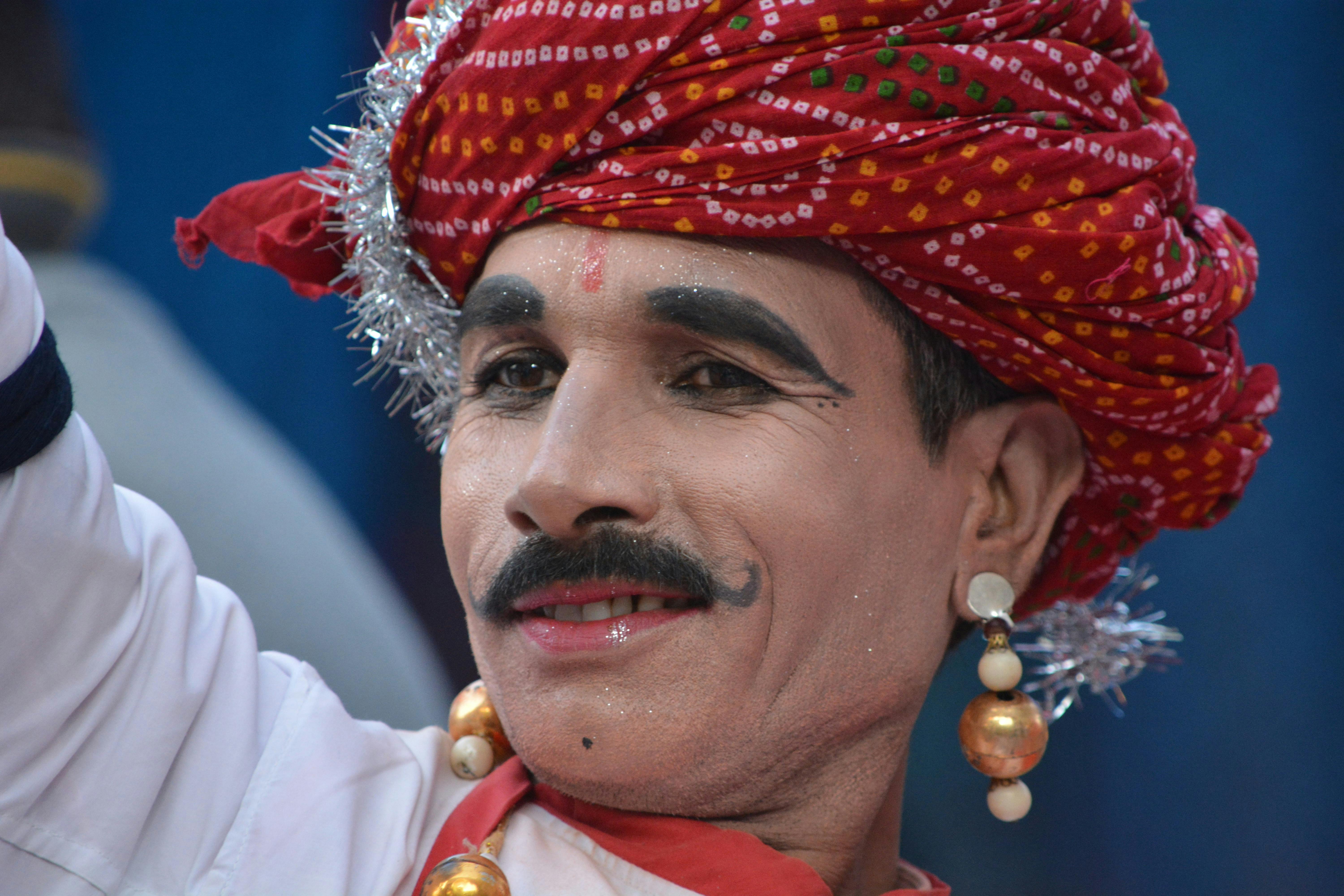 Traditional Indian Performer in Colorful Attire · Free Stock Photo