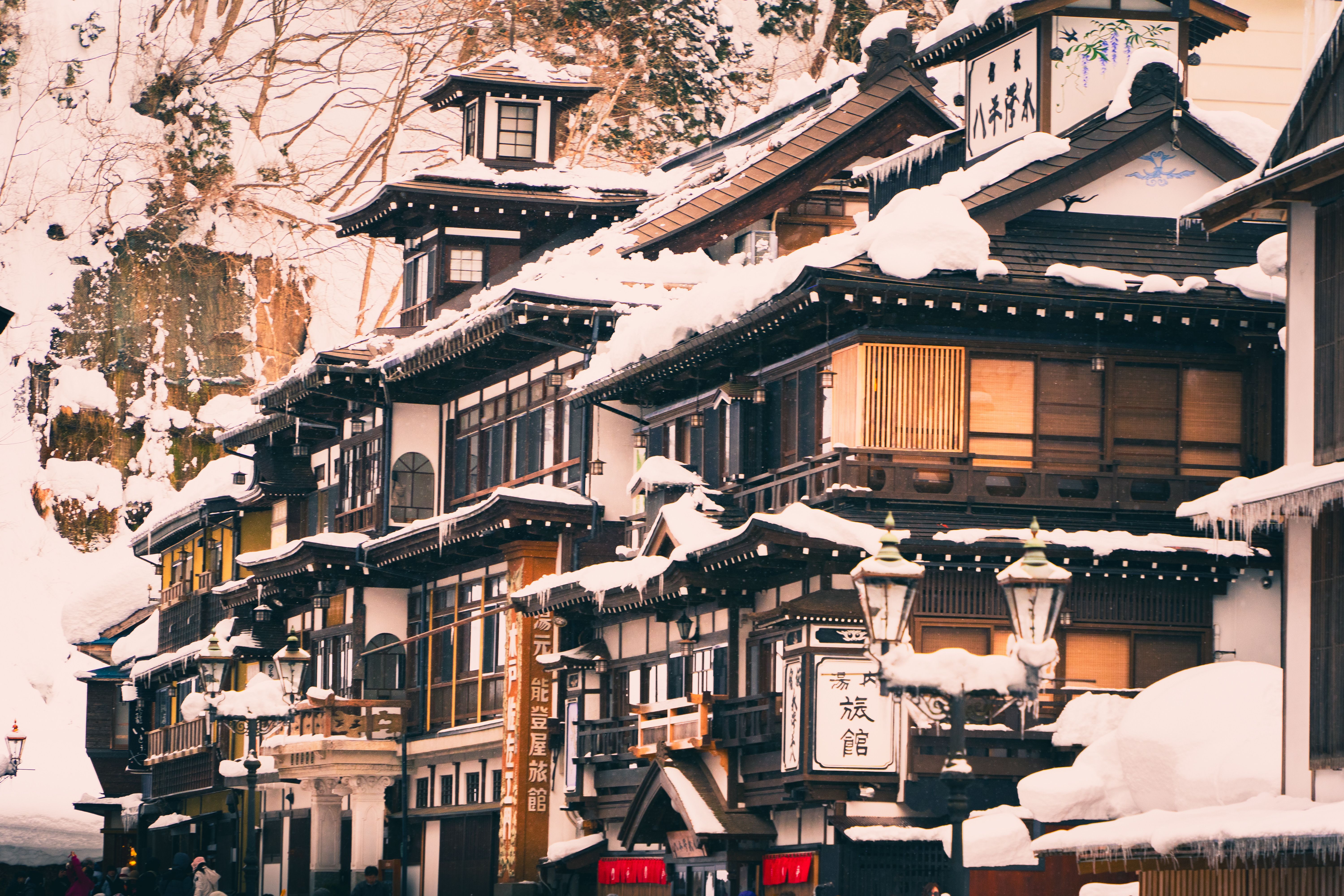 Traditional Japanese architecture in snowy winter scene · Free Stock Photo