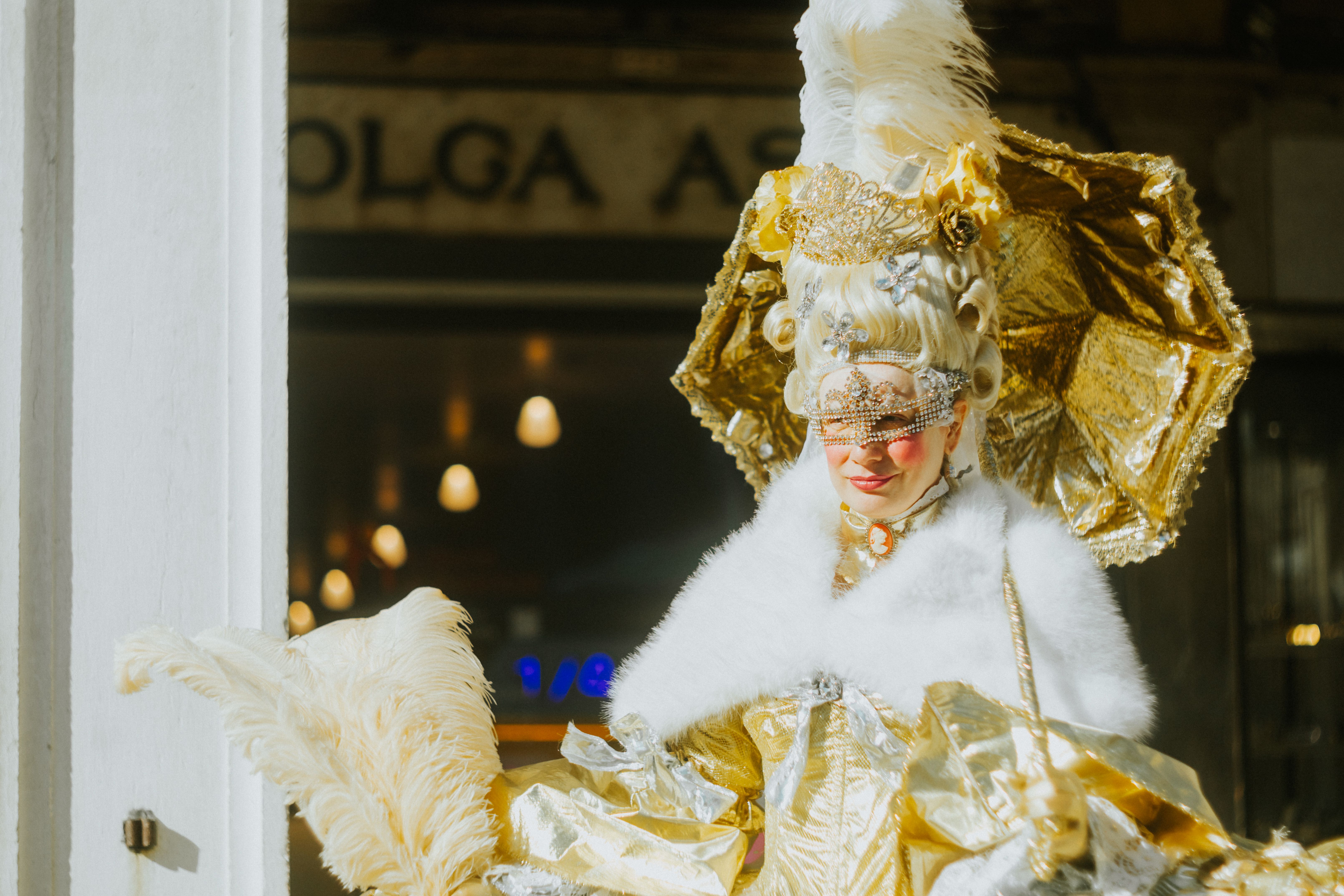 Elegant Venetian Masquerade Costume Display on Street · Free Stock Photo