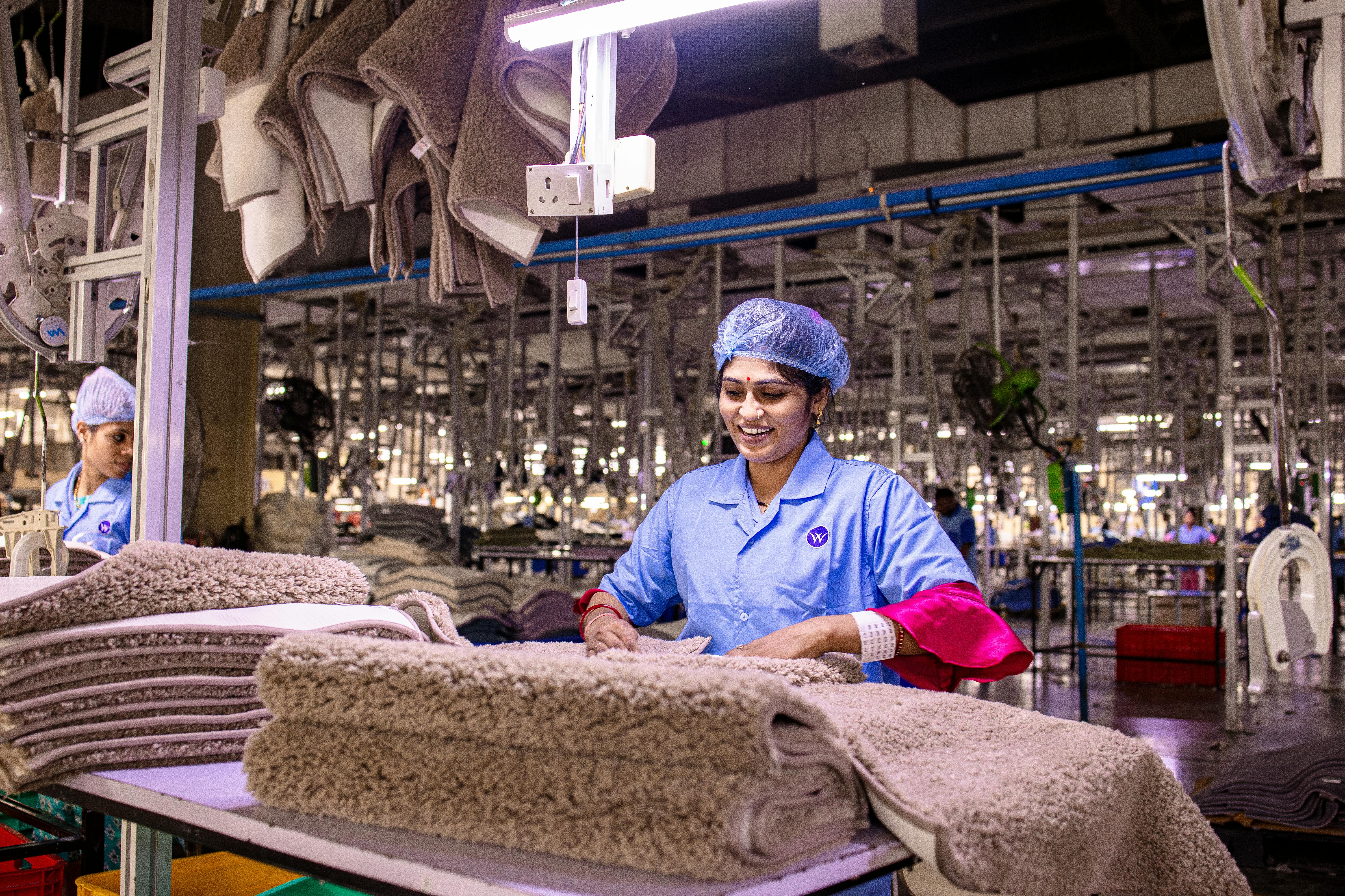 Female Textile Workers in Modern Factory Setting · Free Stock Photo