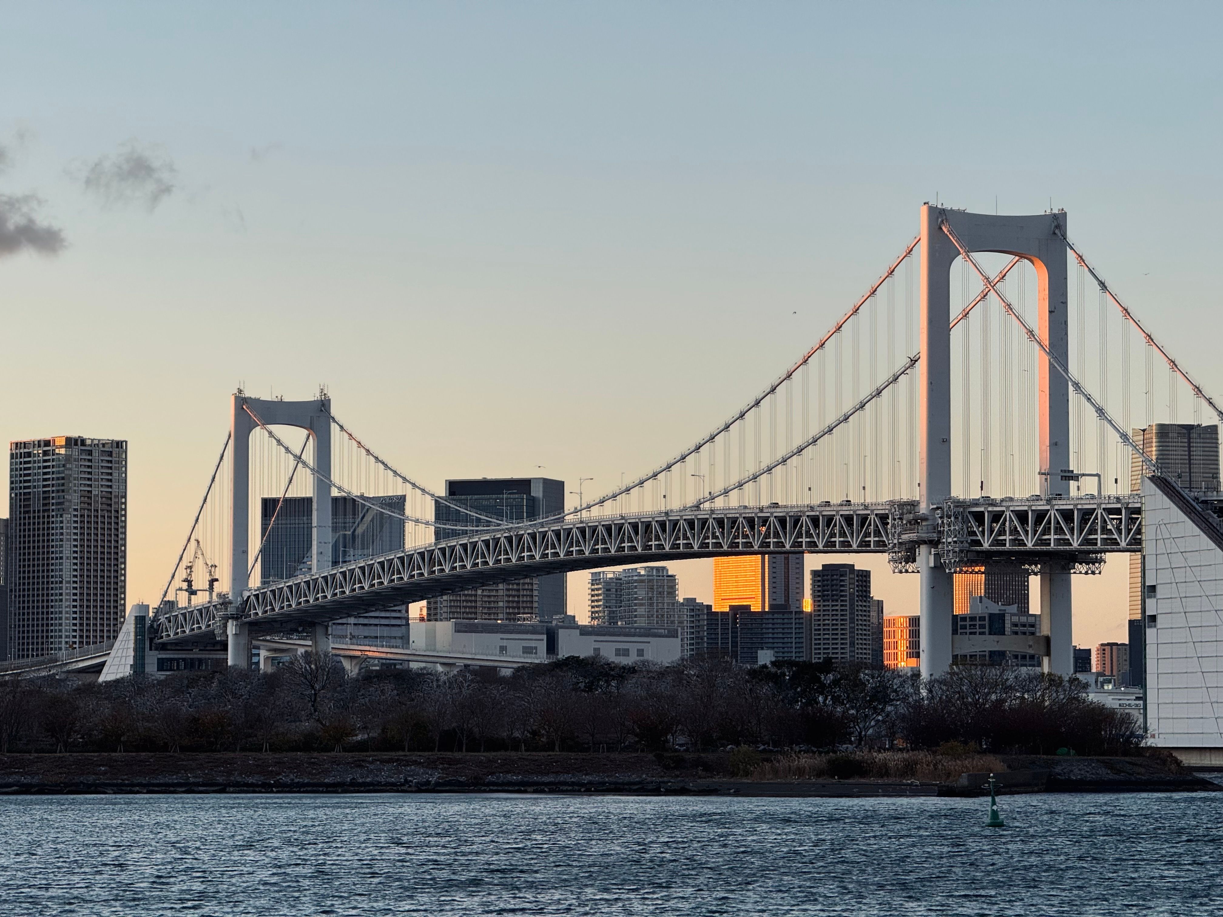 Iconic Rainbow Bridge at Sunset in Tokyo · Free Stock Photo