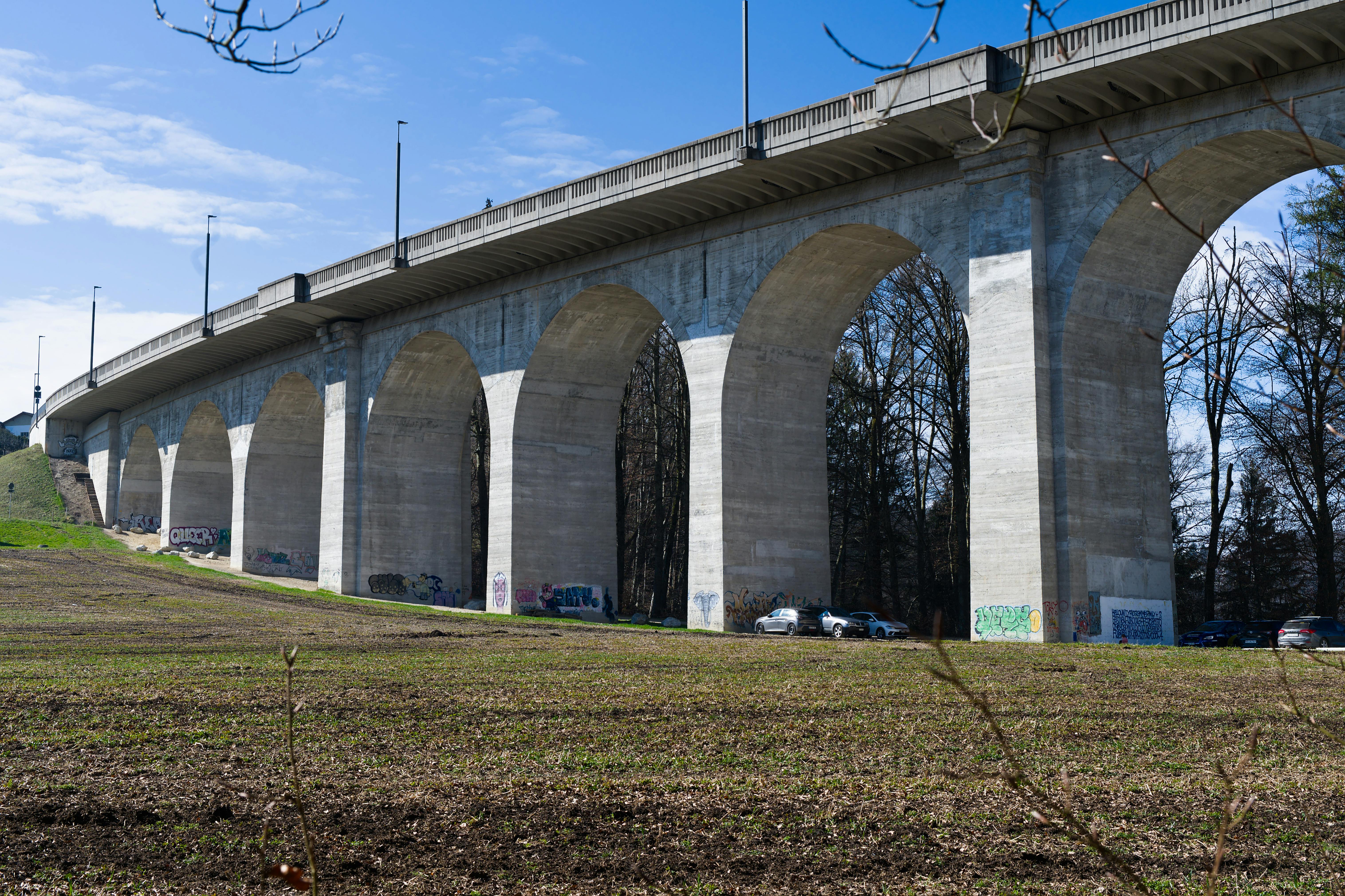 Concrete Arched Viaduct with Graffiti in Switzerland · Free Stock Photo