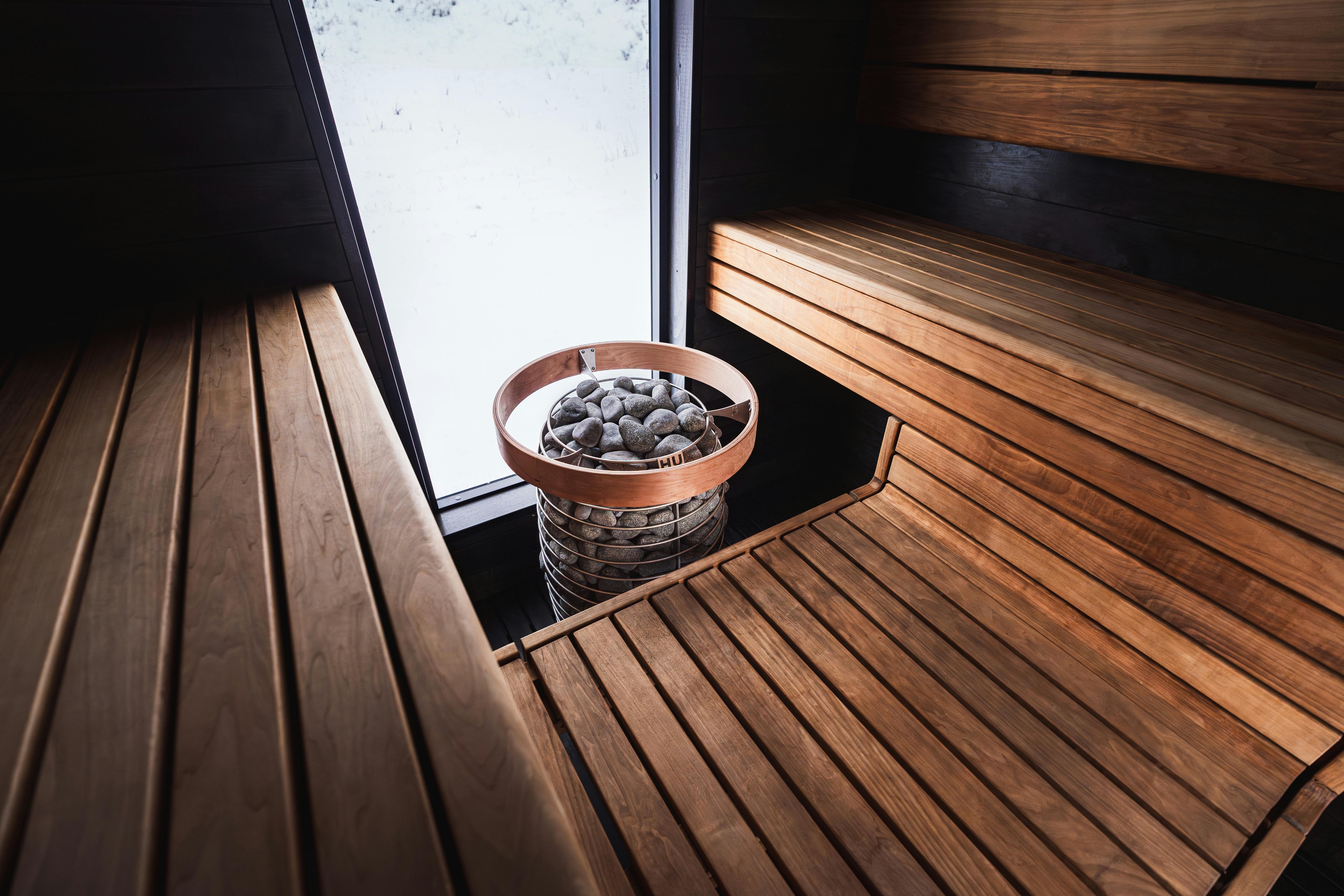 Nordic Style Sauna Interior with Wooden Benches · Free Stock Photo