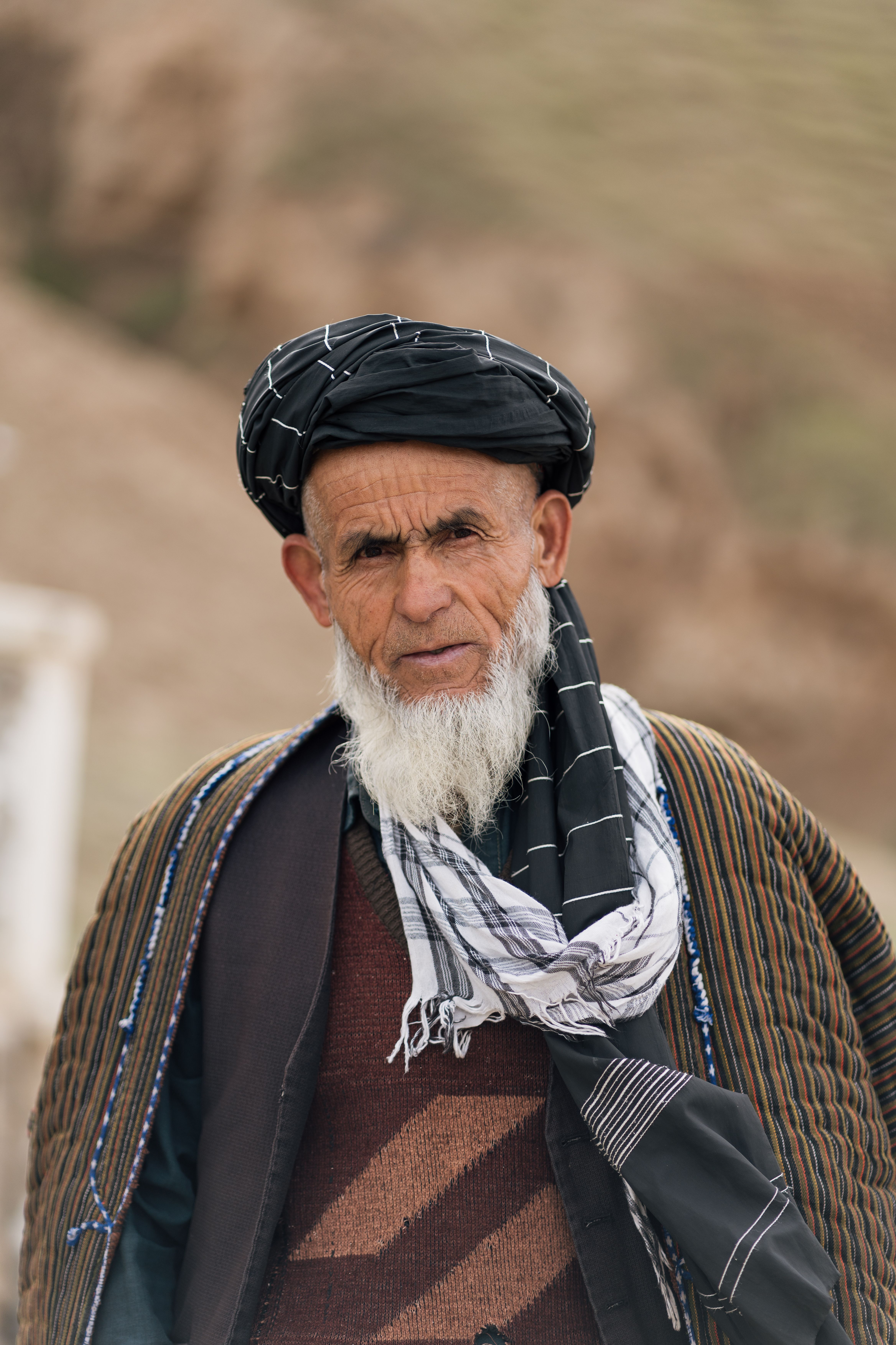 Portrait of an Elderly Afghan Man in Traditional Attire · Free Stock Photo