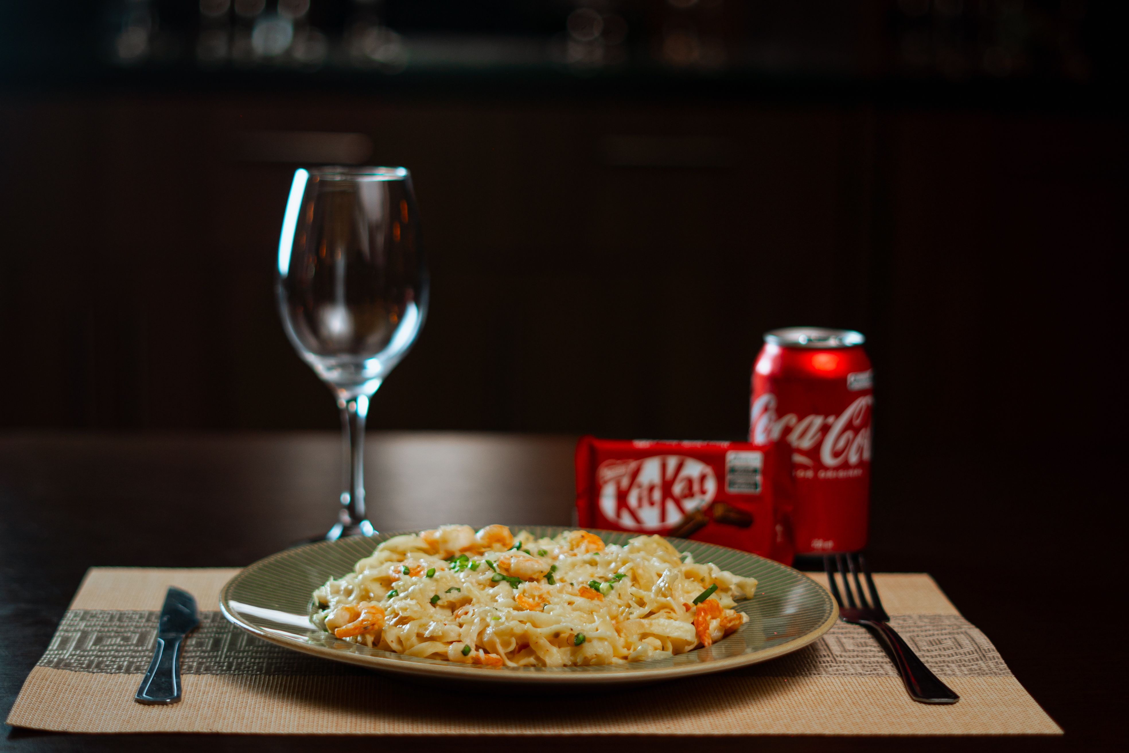 Delicious Creamy Pasta Meal with Soda · Free Stock Photo