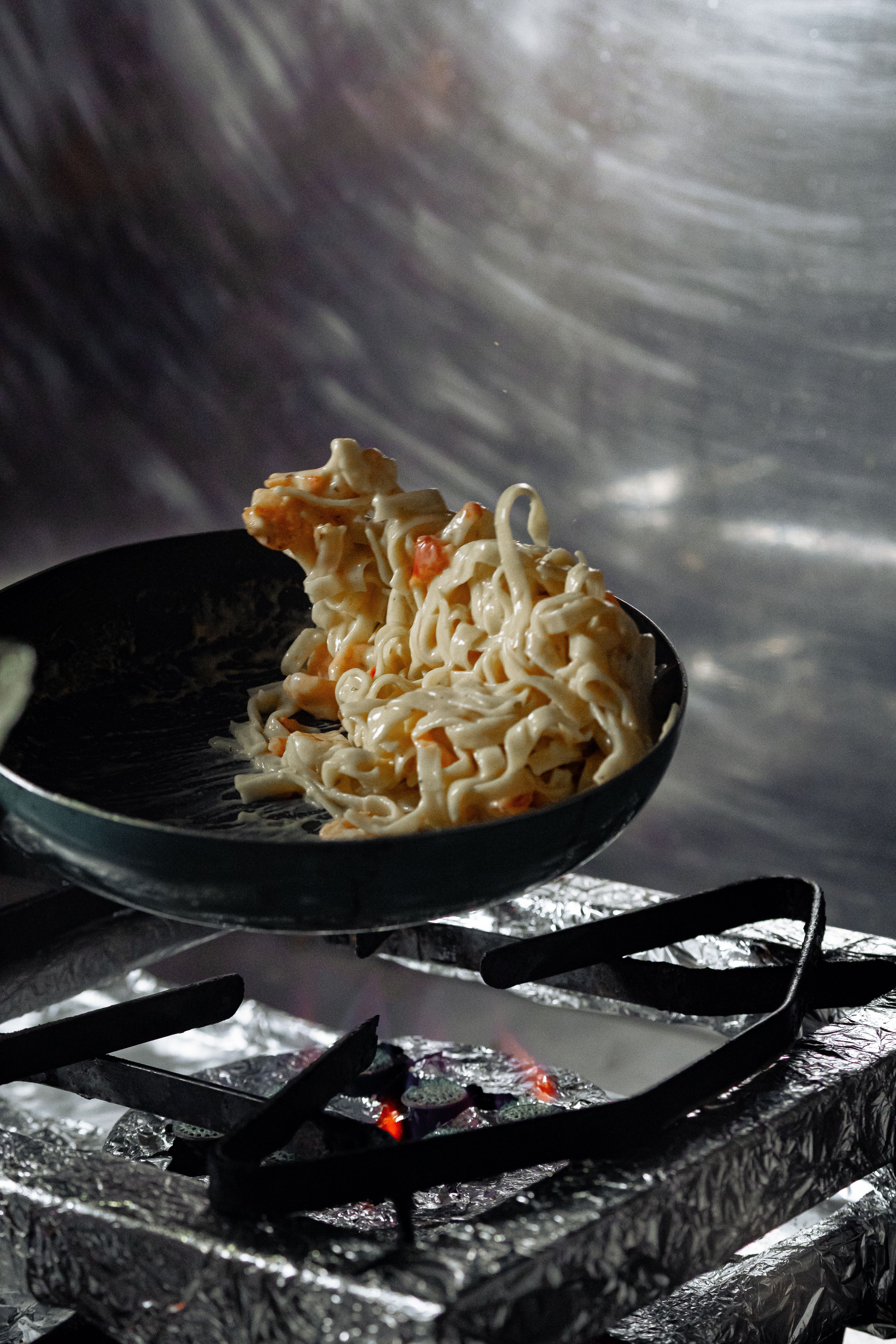 Close-Up of Noodles Cooking on Stovetop · Free Stock Photo