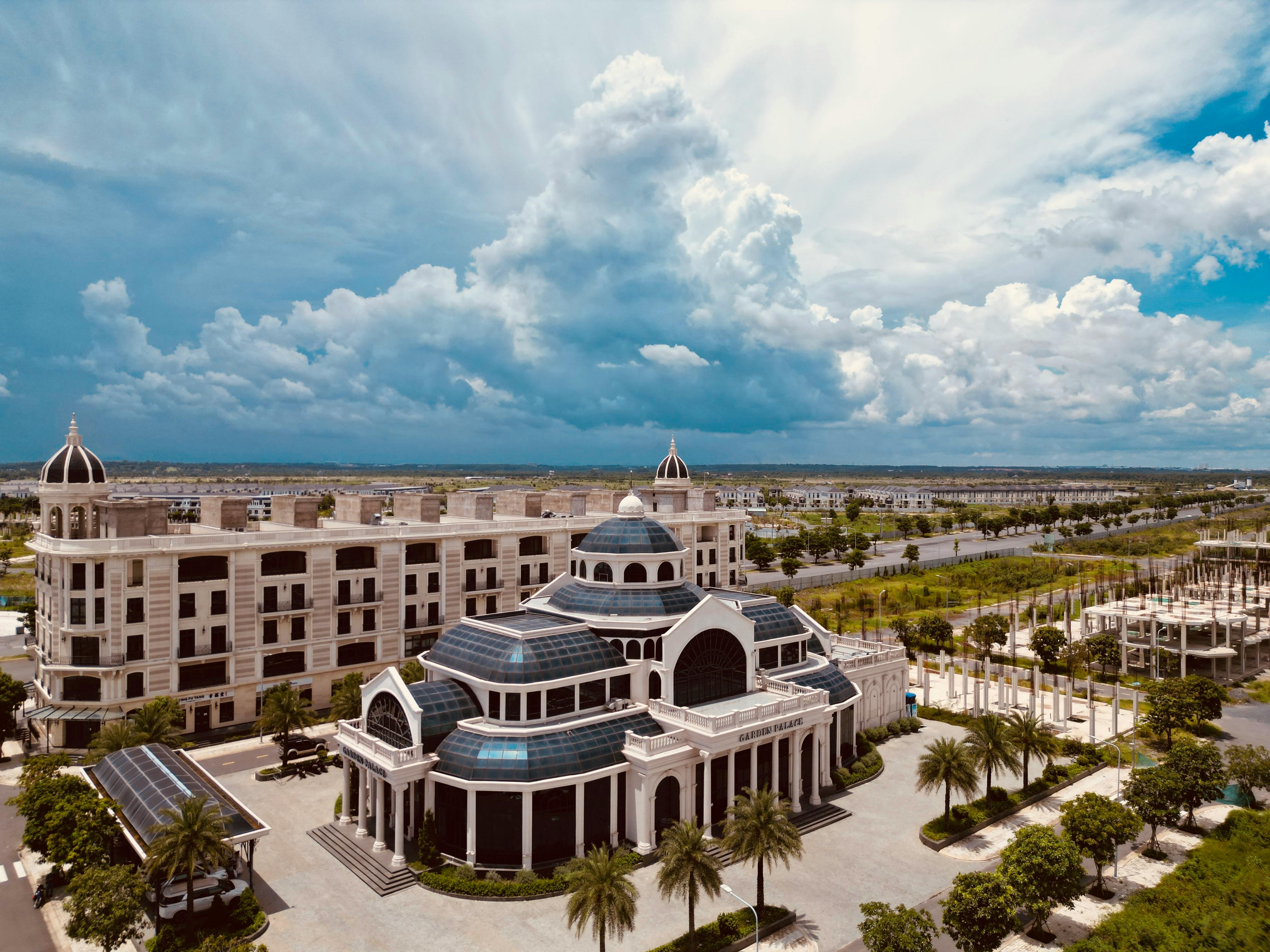 Grand Architectural Building Under Dramatic Sky · Free Stock Photo