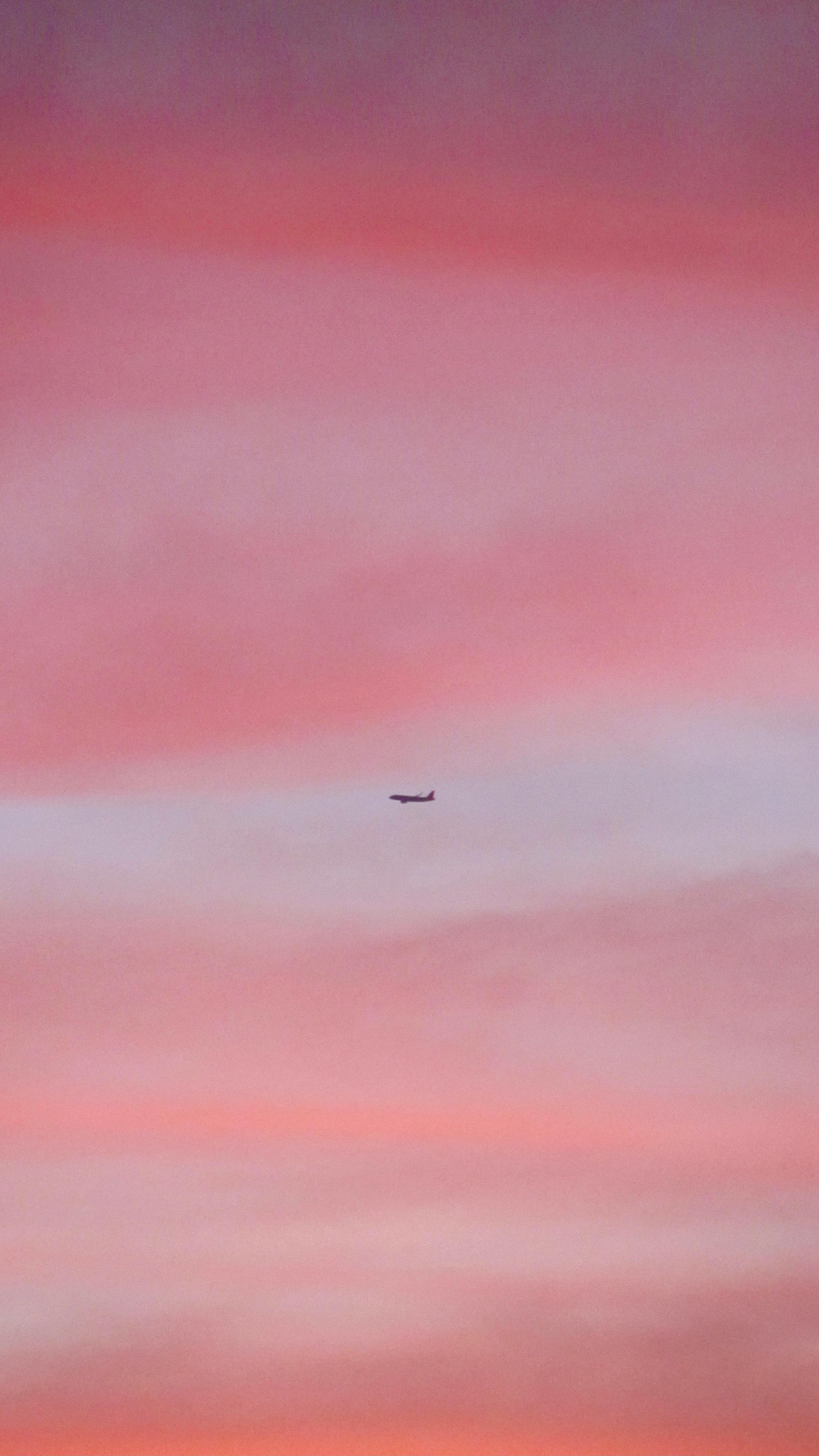 Airplane Flying at Sunset in Pink Skies · Free Stock Photo