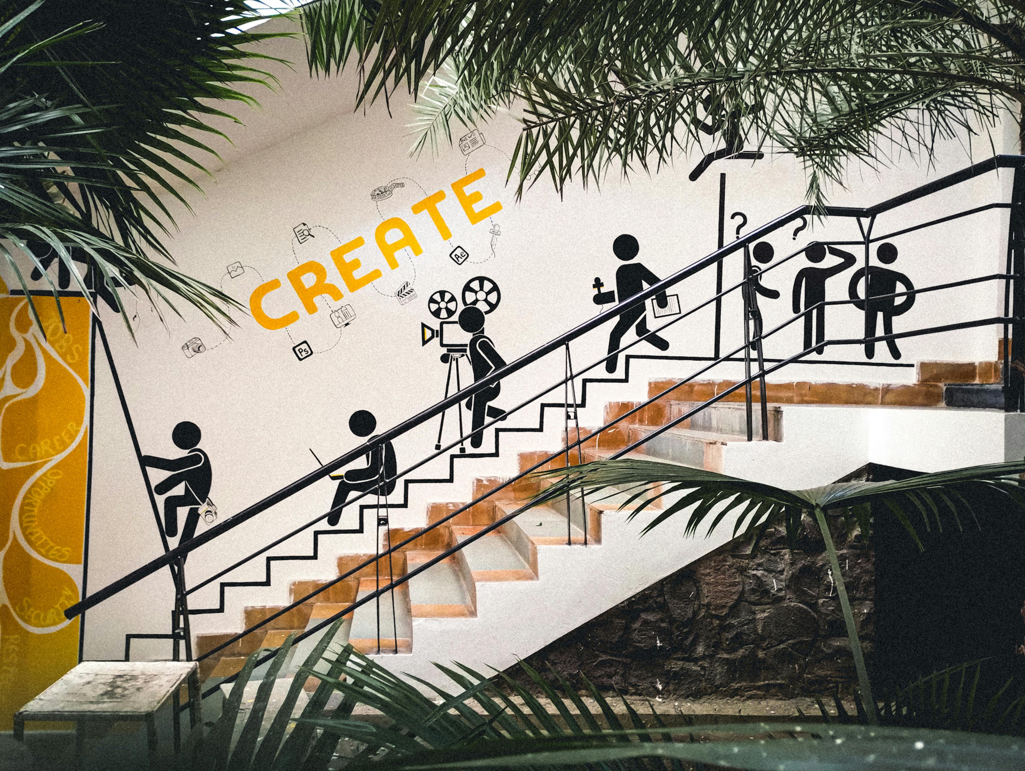 Inspirational Creative Mural on Staircase · Free Stock Photo