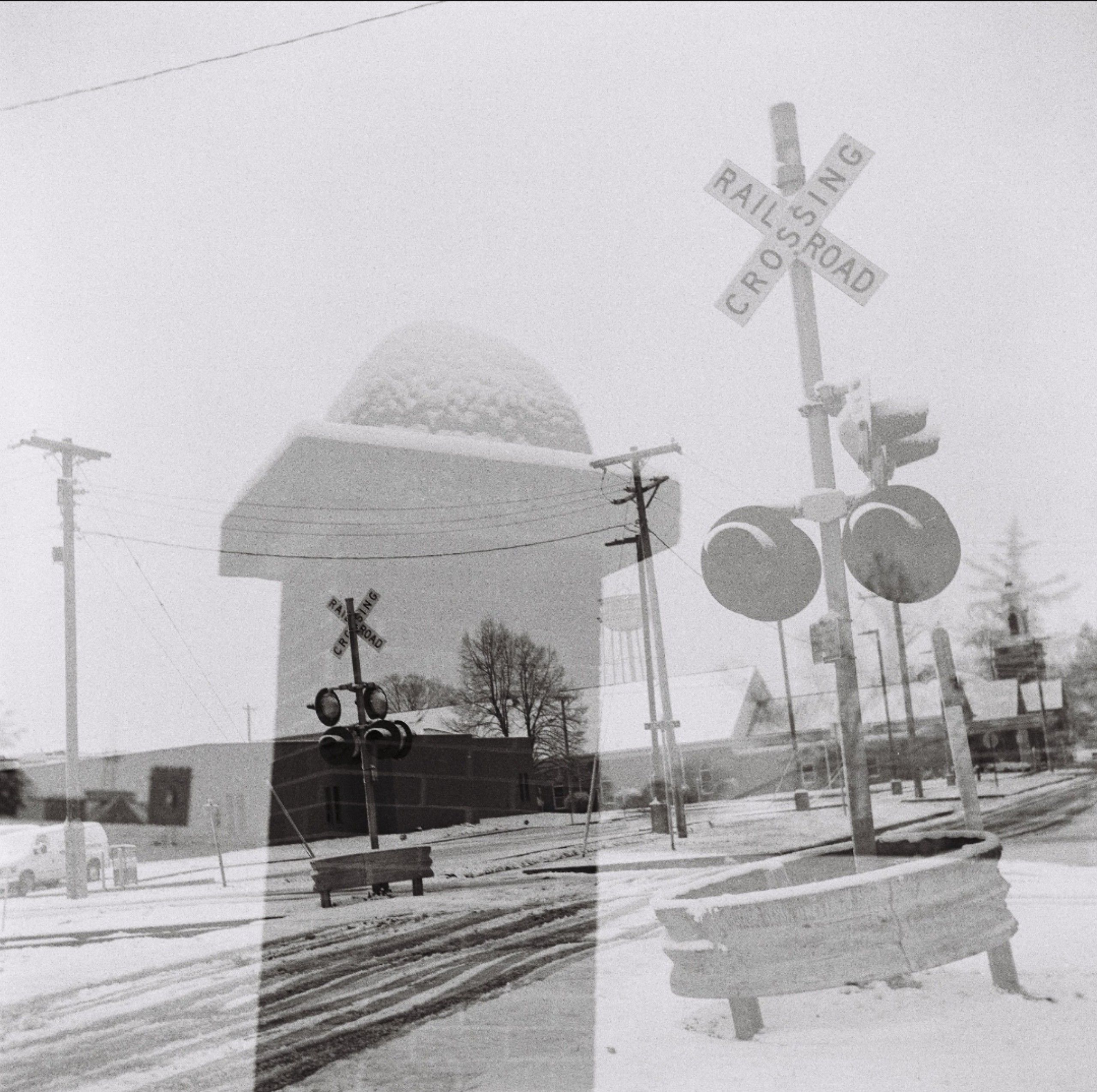 Vintage Double Exposure of Snowy Railroad Crossing · Free Stock Photo