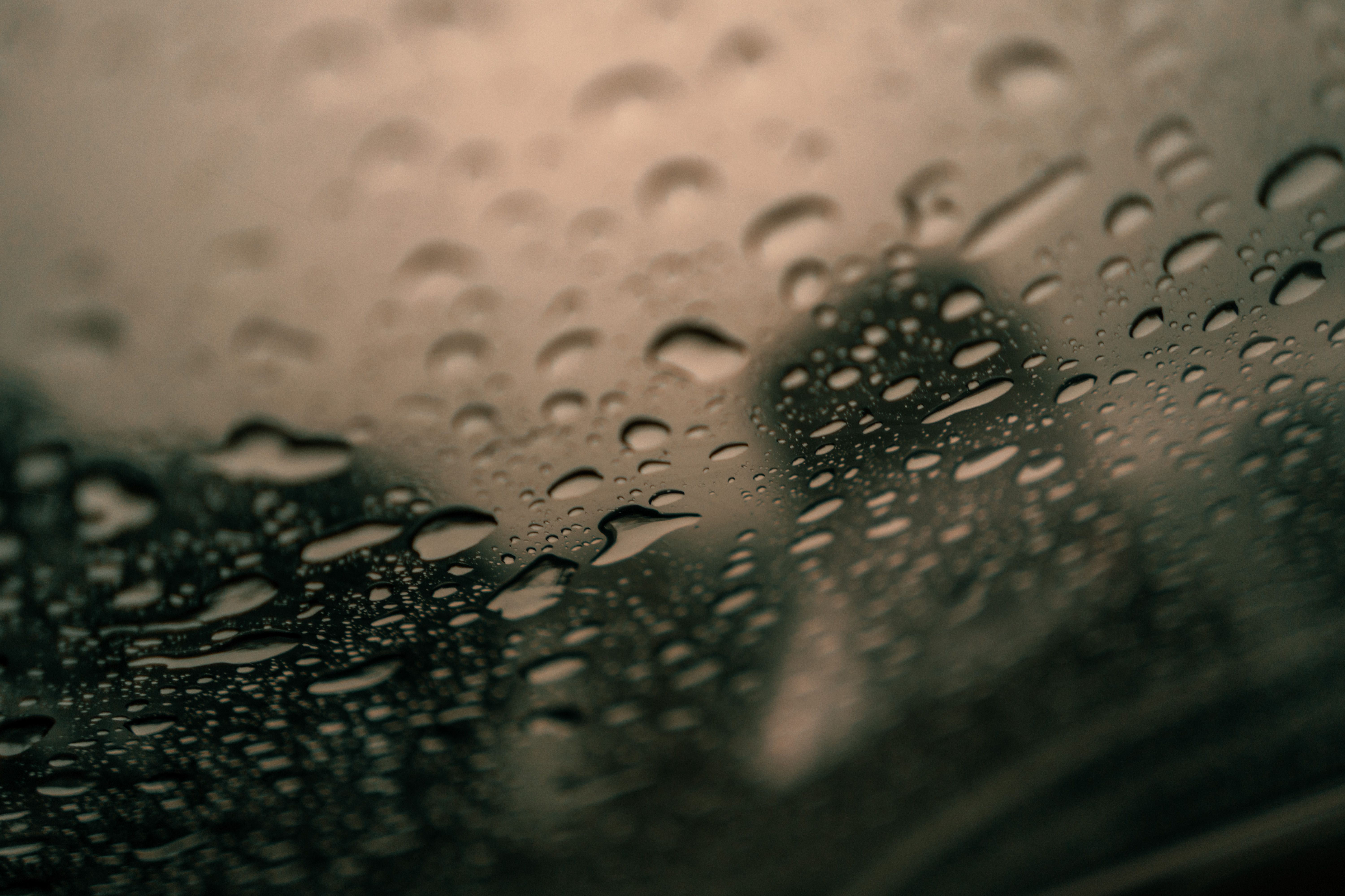 Close-up of Rain Droplets on Window Glass · Free Stock Photo