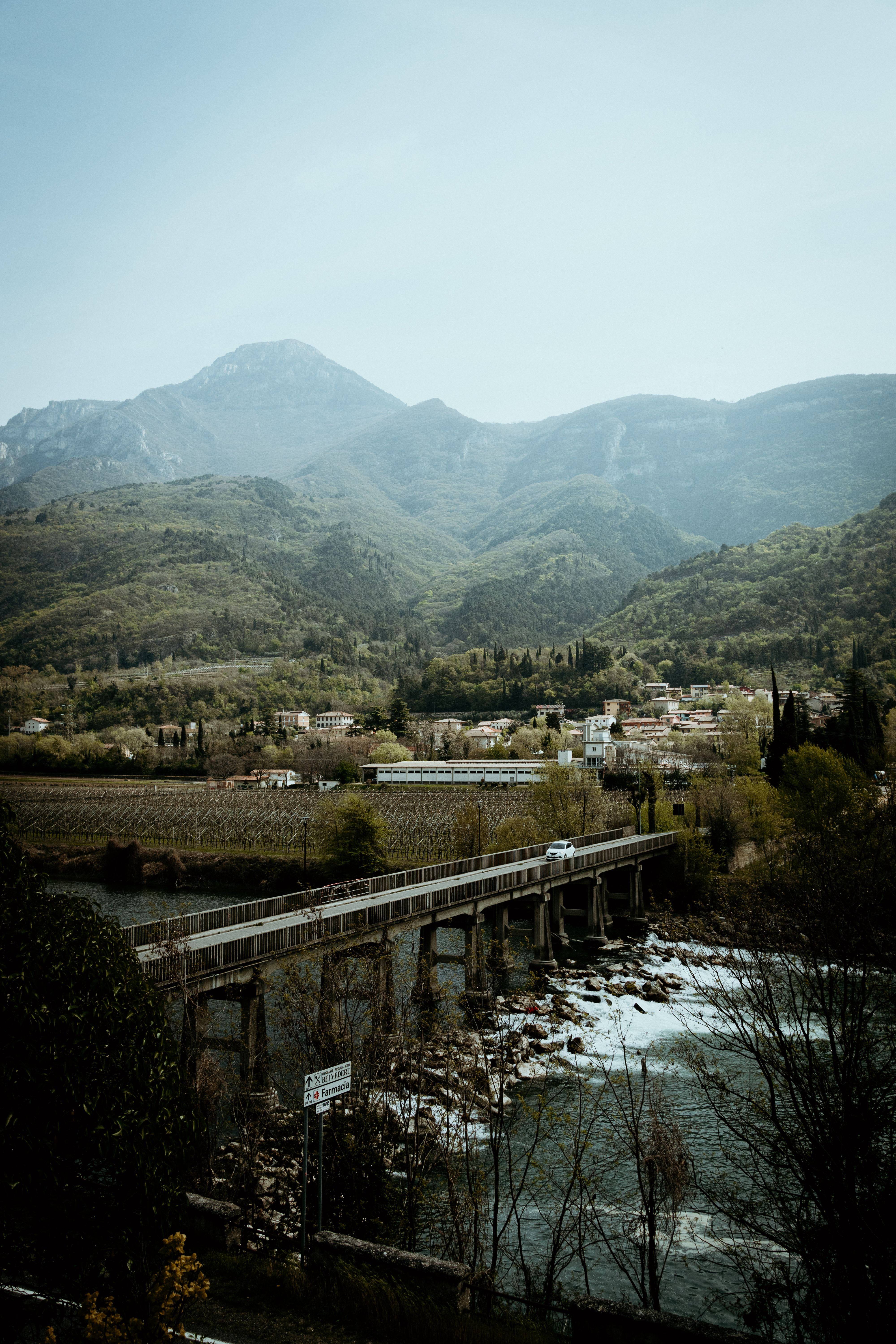 Rustic Village Bridge with Majestic Mountain View · Free Stock Photo