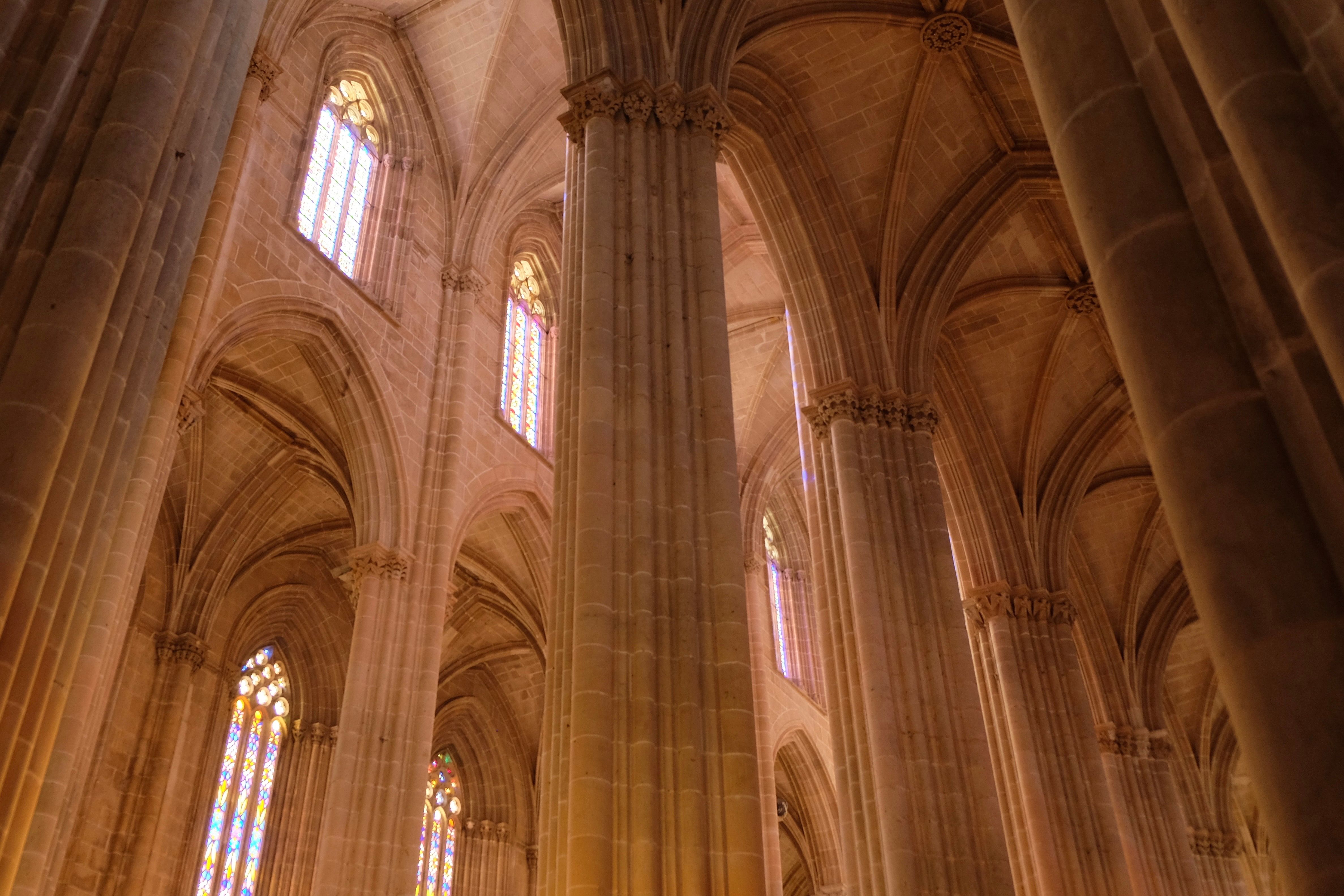 Majestic Gothic Cathedral Interior with Vaulted Ceilings · Free Stock Photo