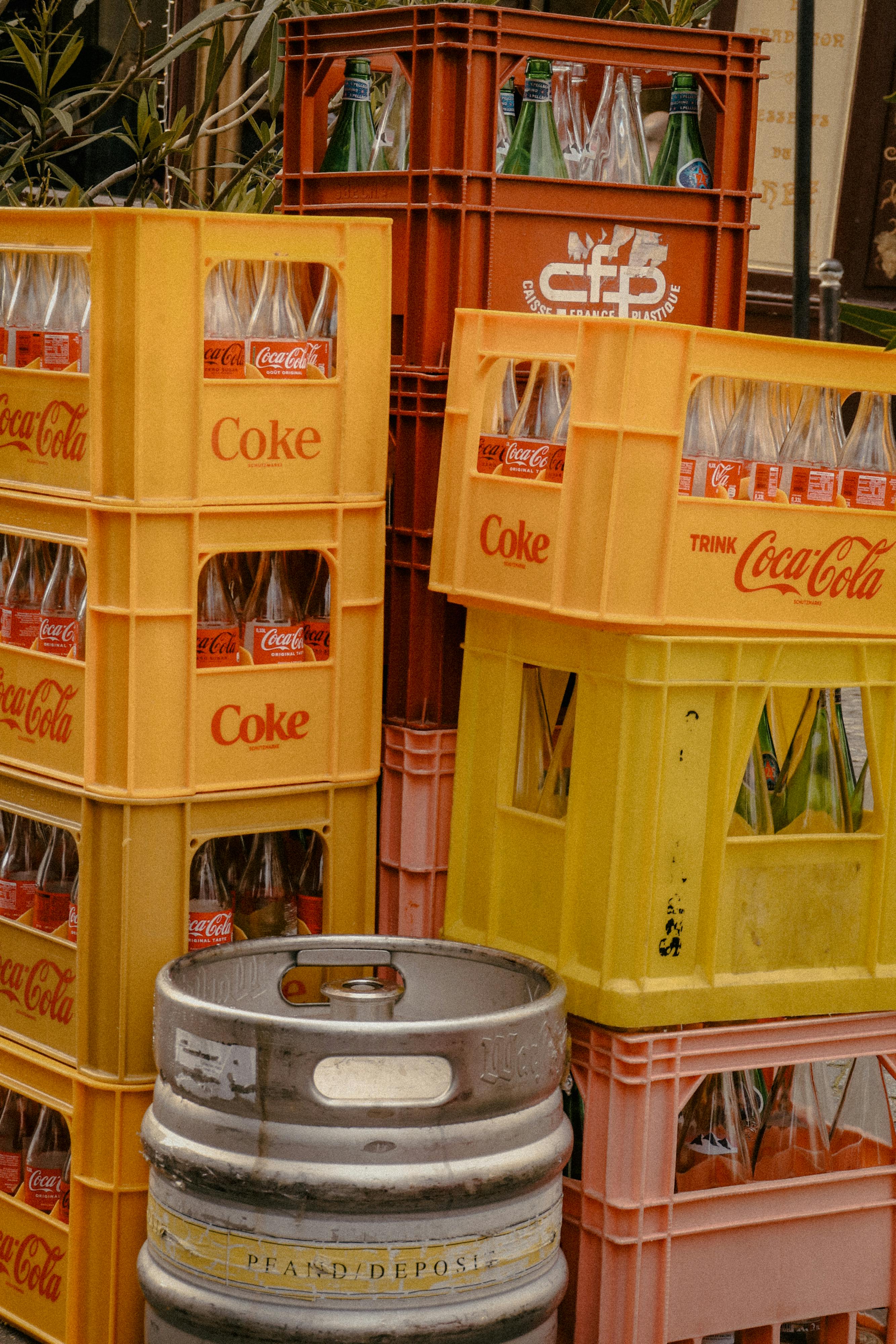 Stacked Coke Crates in Paris Street Scene · Free Stock Photo