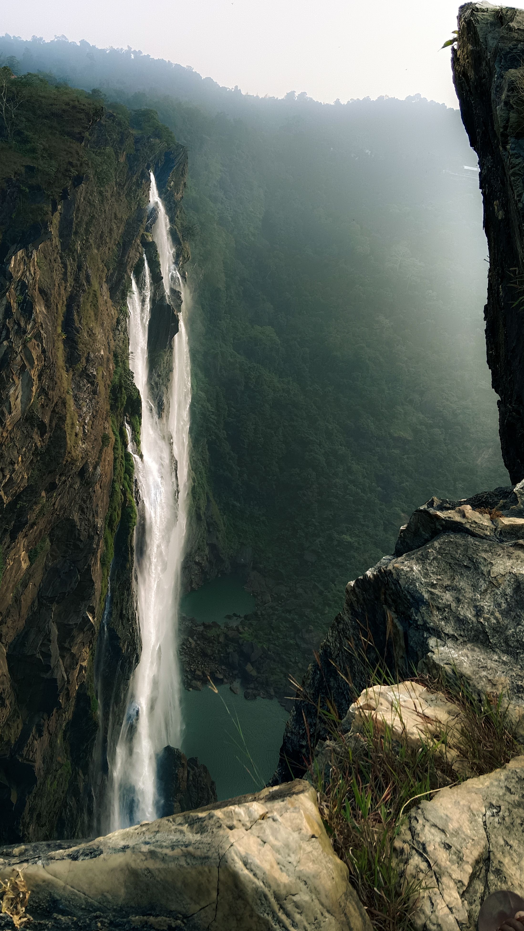 Stunning Waterfall Cascading Over Rocky Cliff · Free Stock Photo
