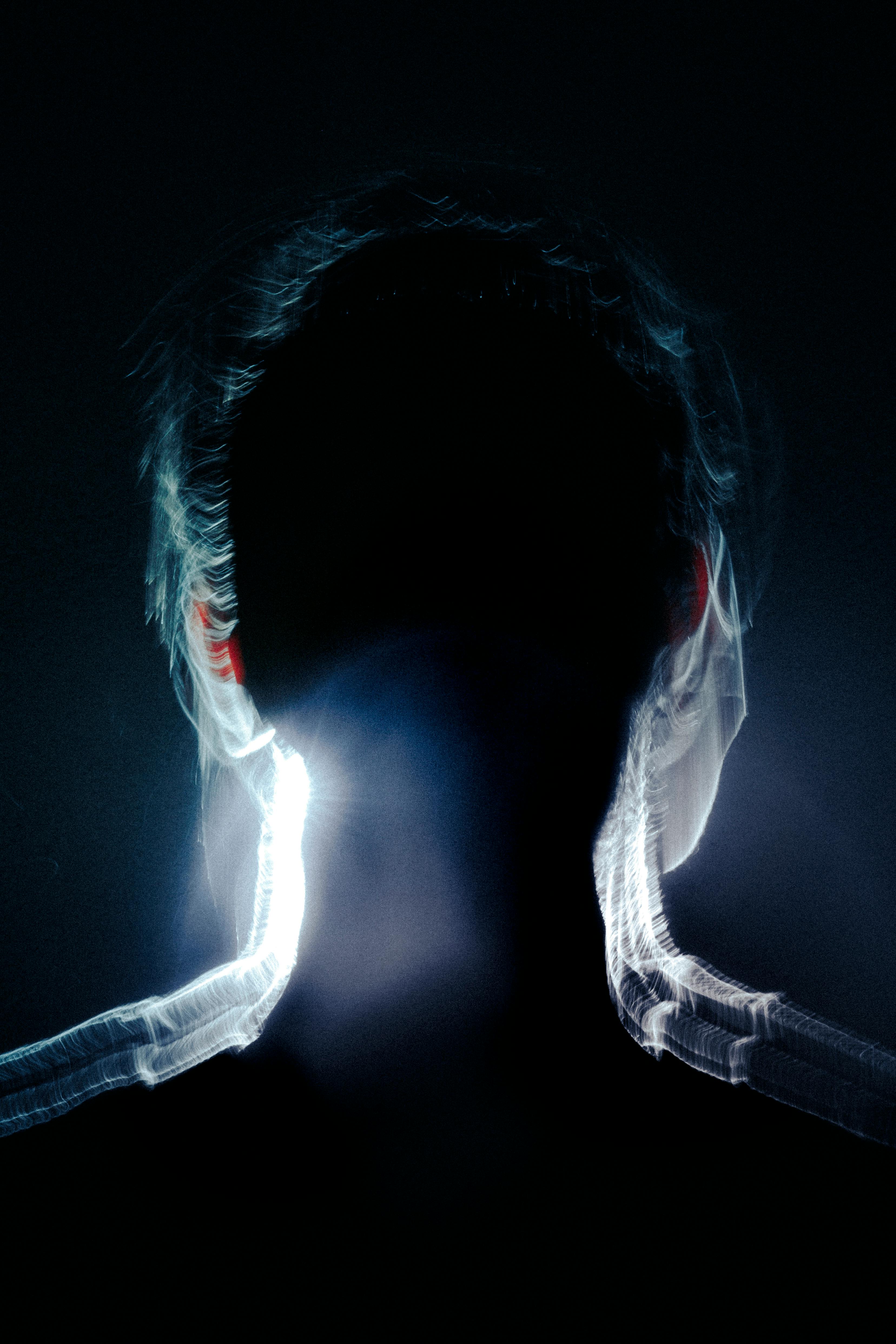 Abstract Portrait with Light Trails and Shadows · Free Stock Photo