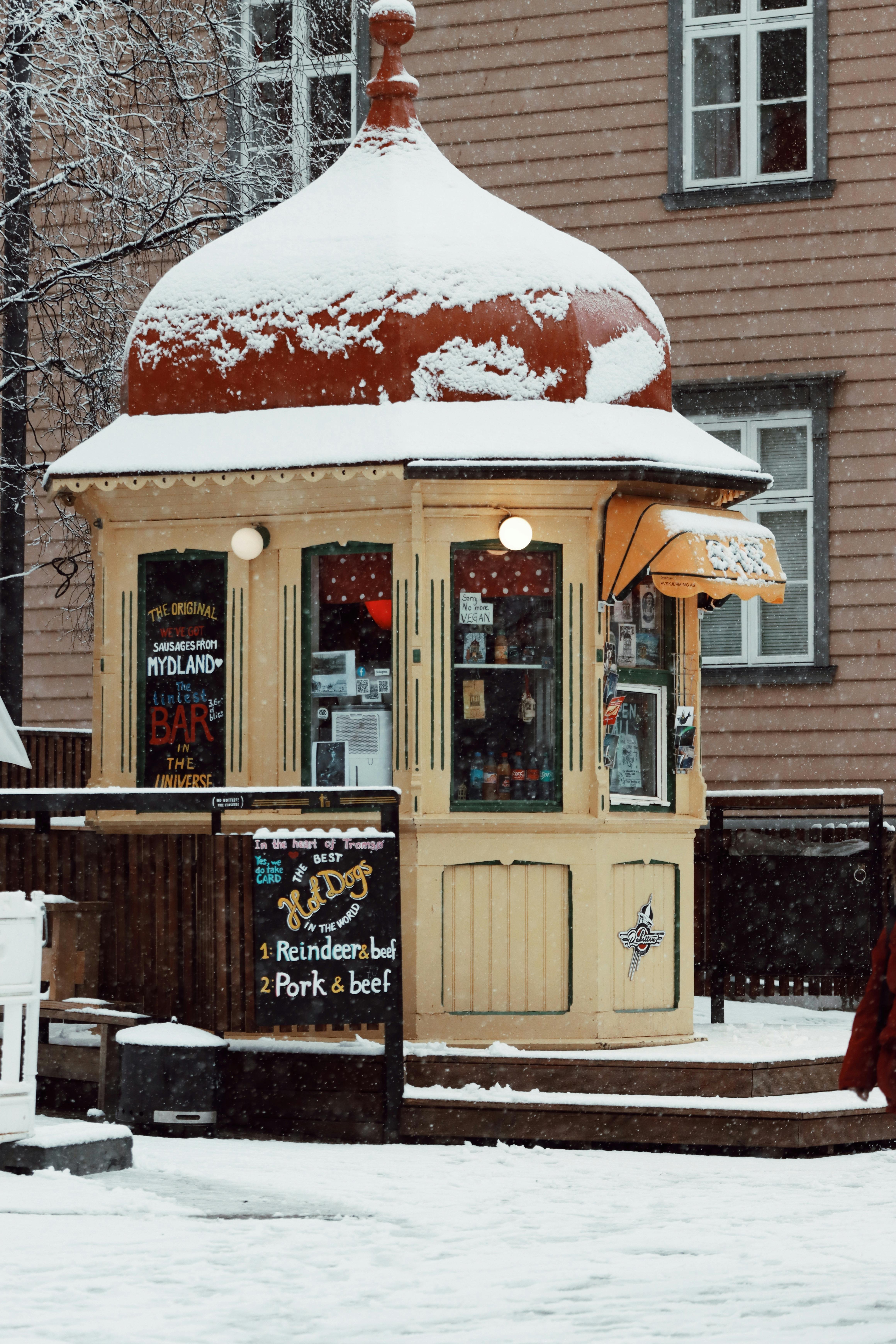 Charming Snow-Covered Kiosk in Tromsø, Norway · Free Stock Photo