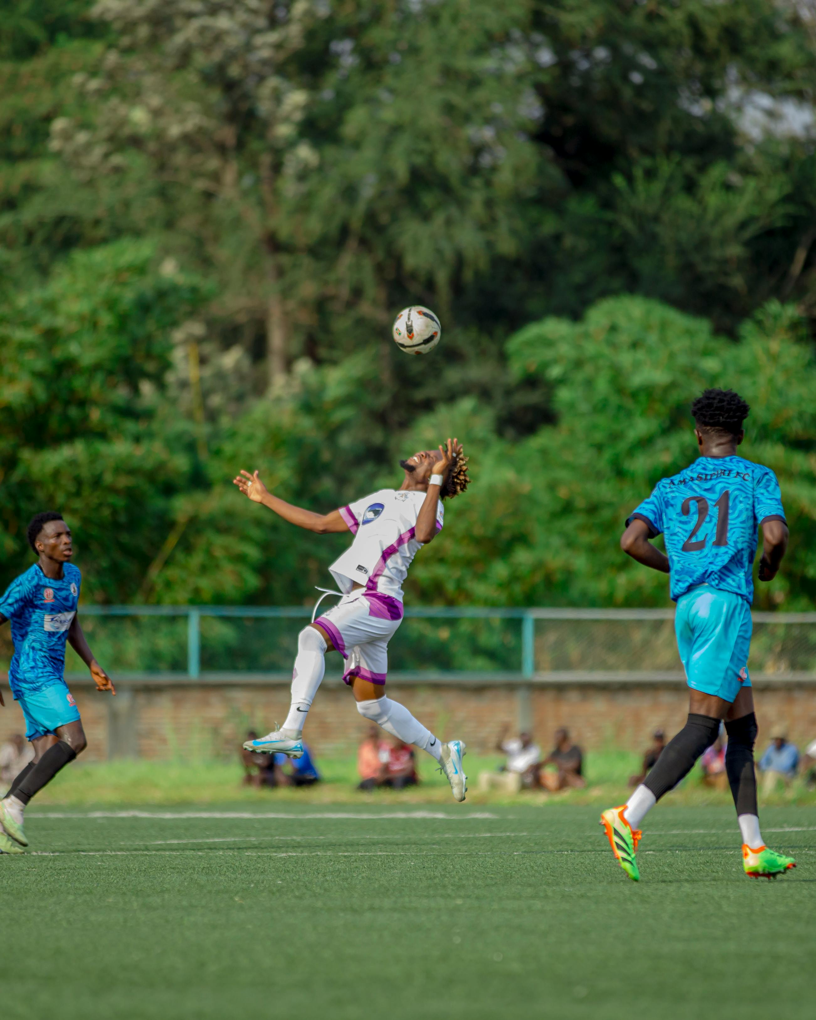 Dynamic Soccer Match Action Shot Outdoors · Free Stock Photo