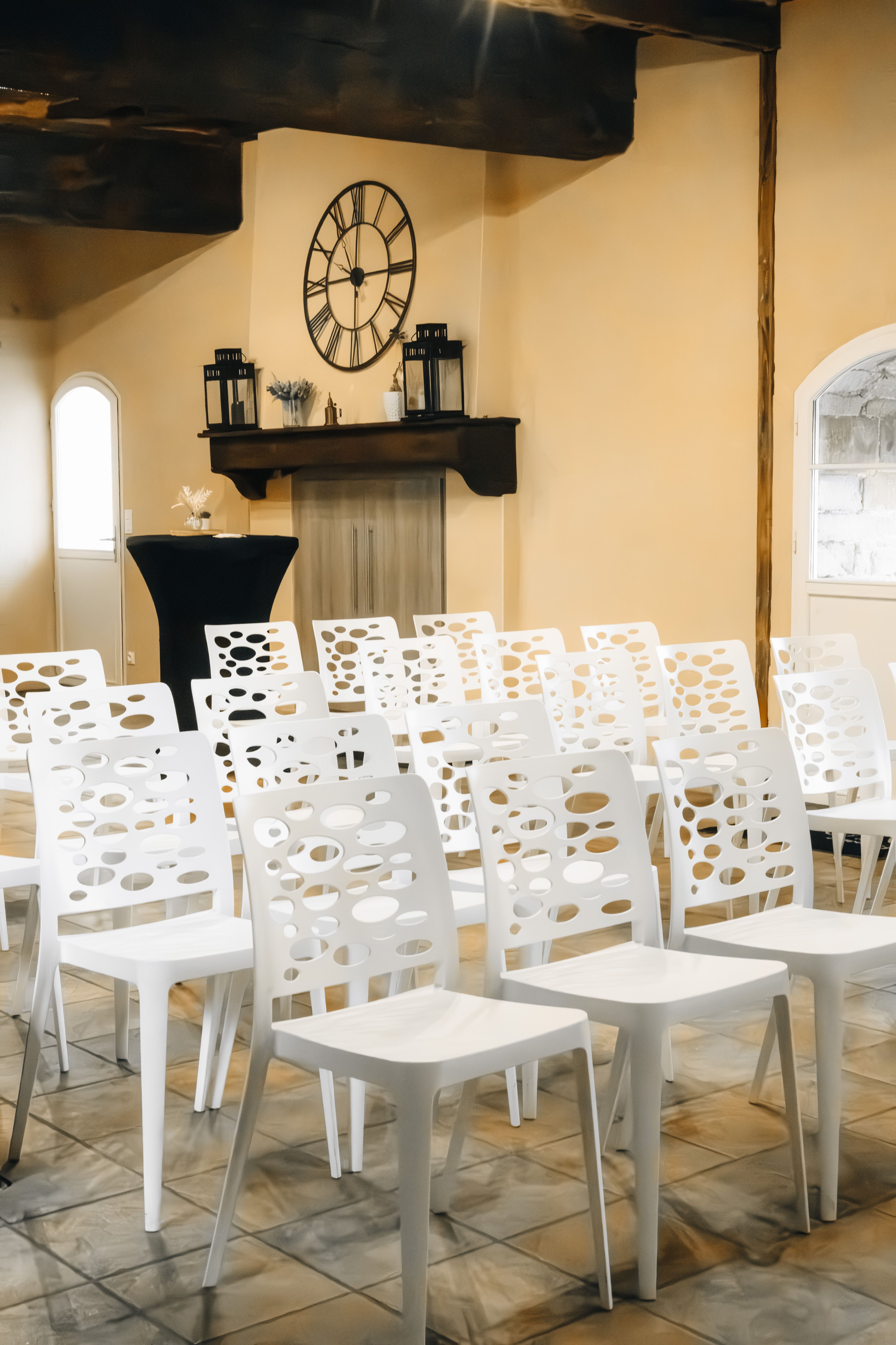 Modern Event Venue with Decorative White Chairs · Free Stock Photo