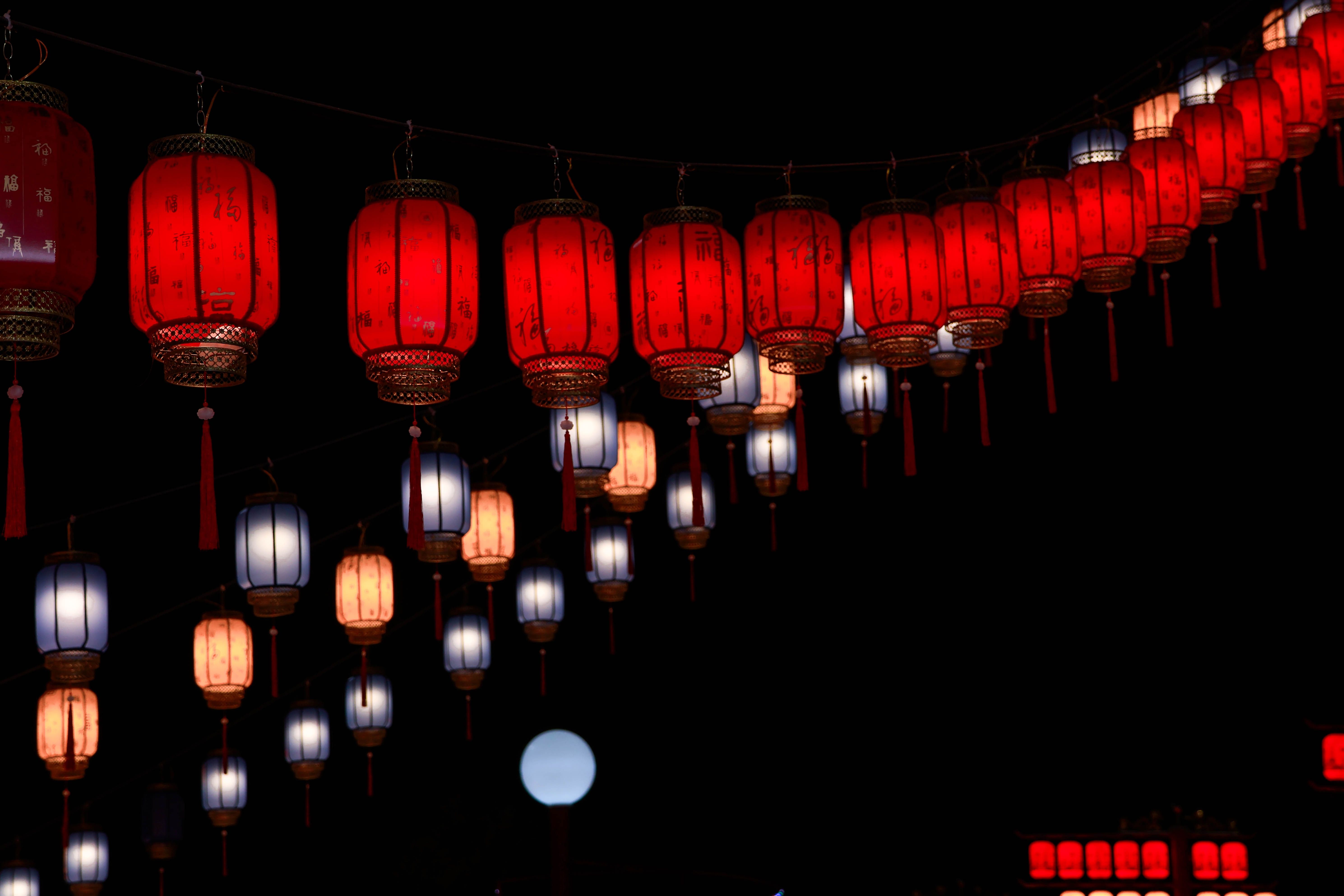 Vibrant Red Lanterns Adorning Night Sky · Free Stock Photo