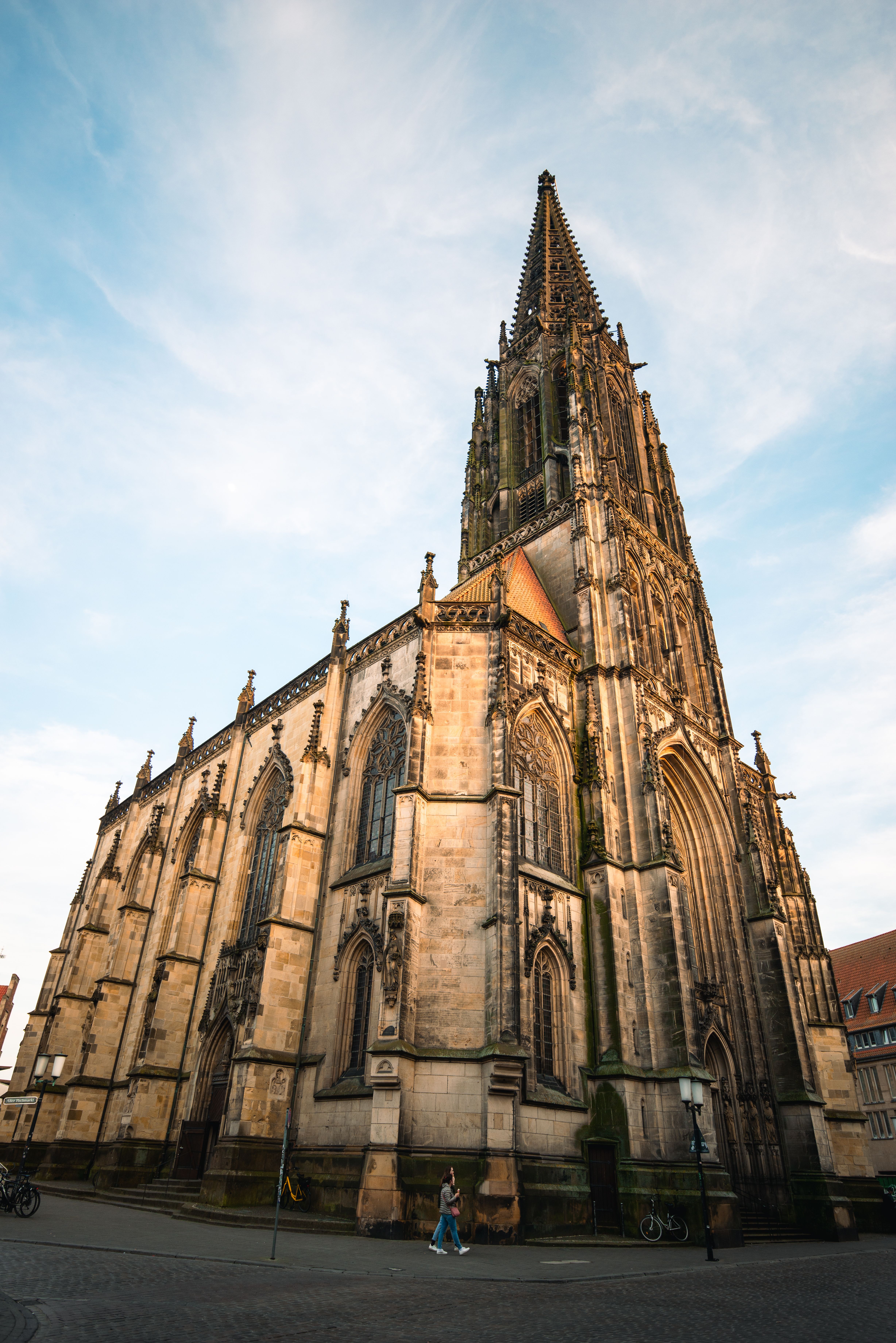 Historic Gothic Church with Tower in Sunlight · Free Stock Photo