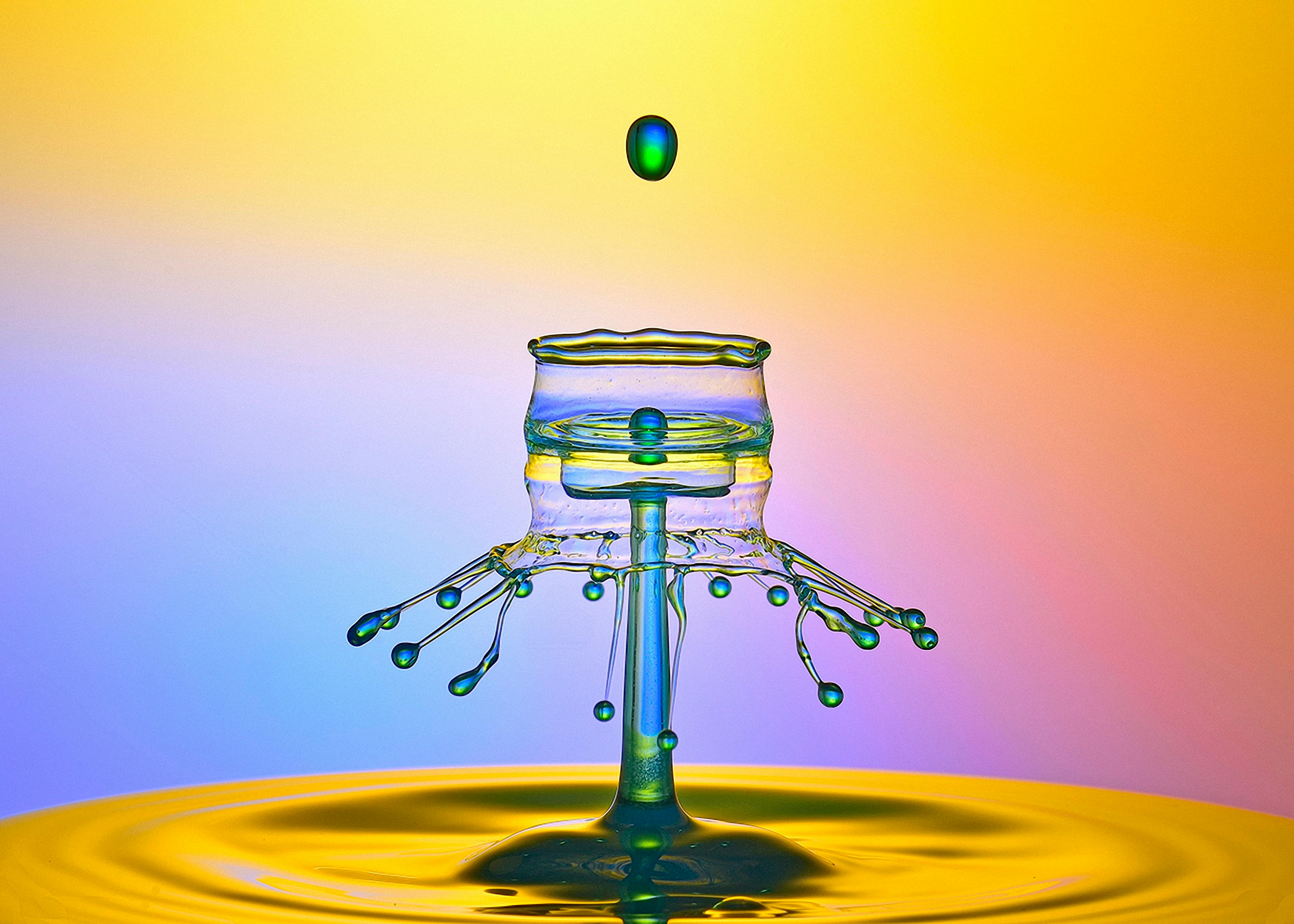 Vibrant Water Drop Collision in Dynamic Colors · Free Stock Photo