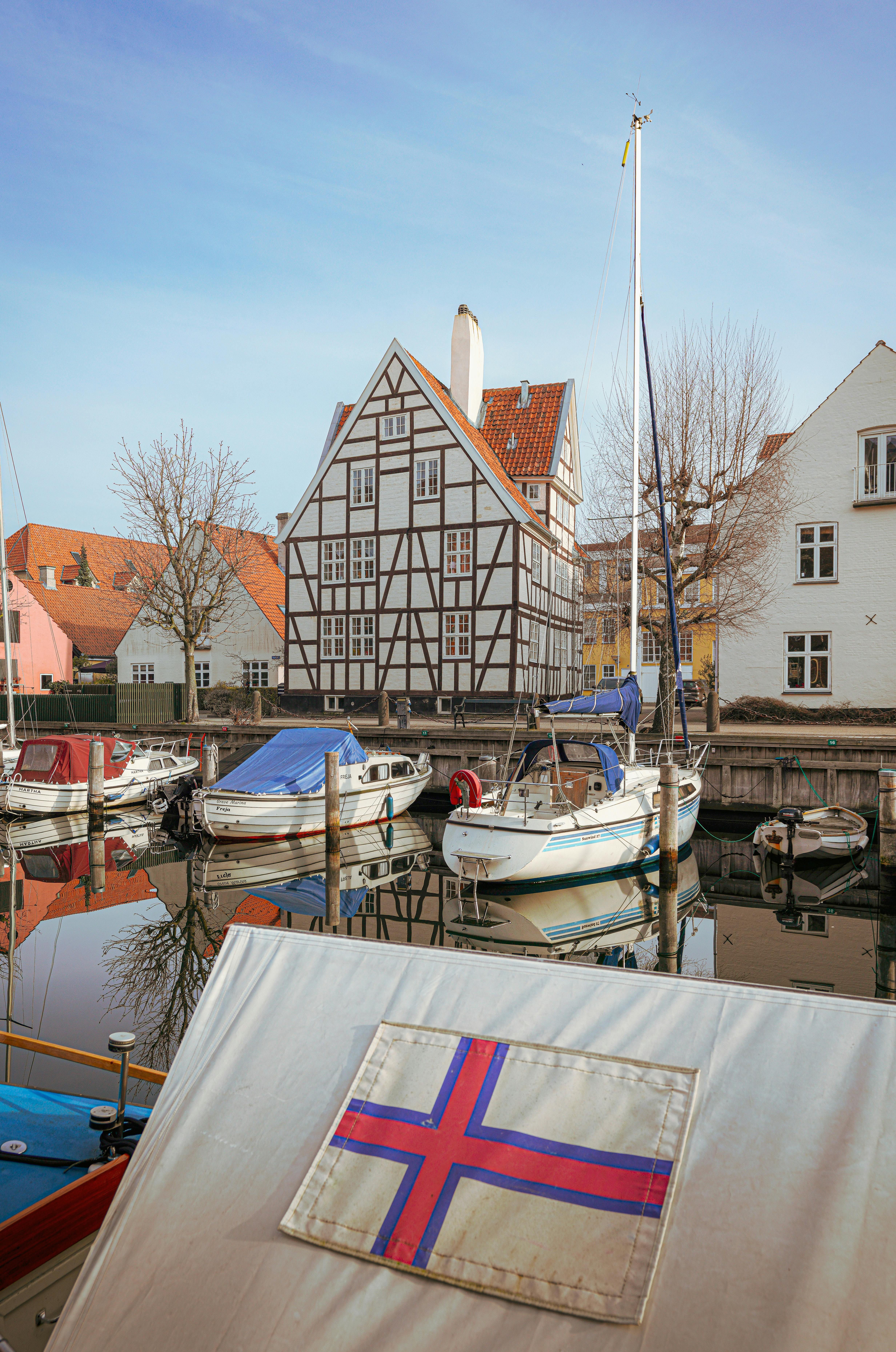 Quaint European Harbor with Historic Architecture · Free Stock Photo