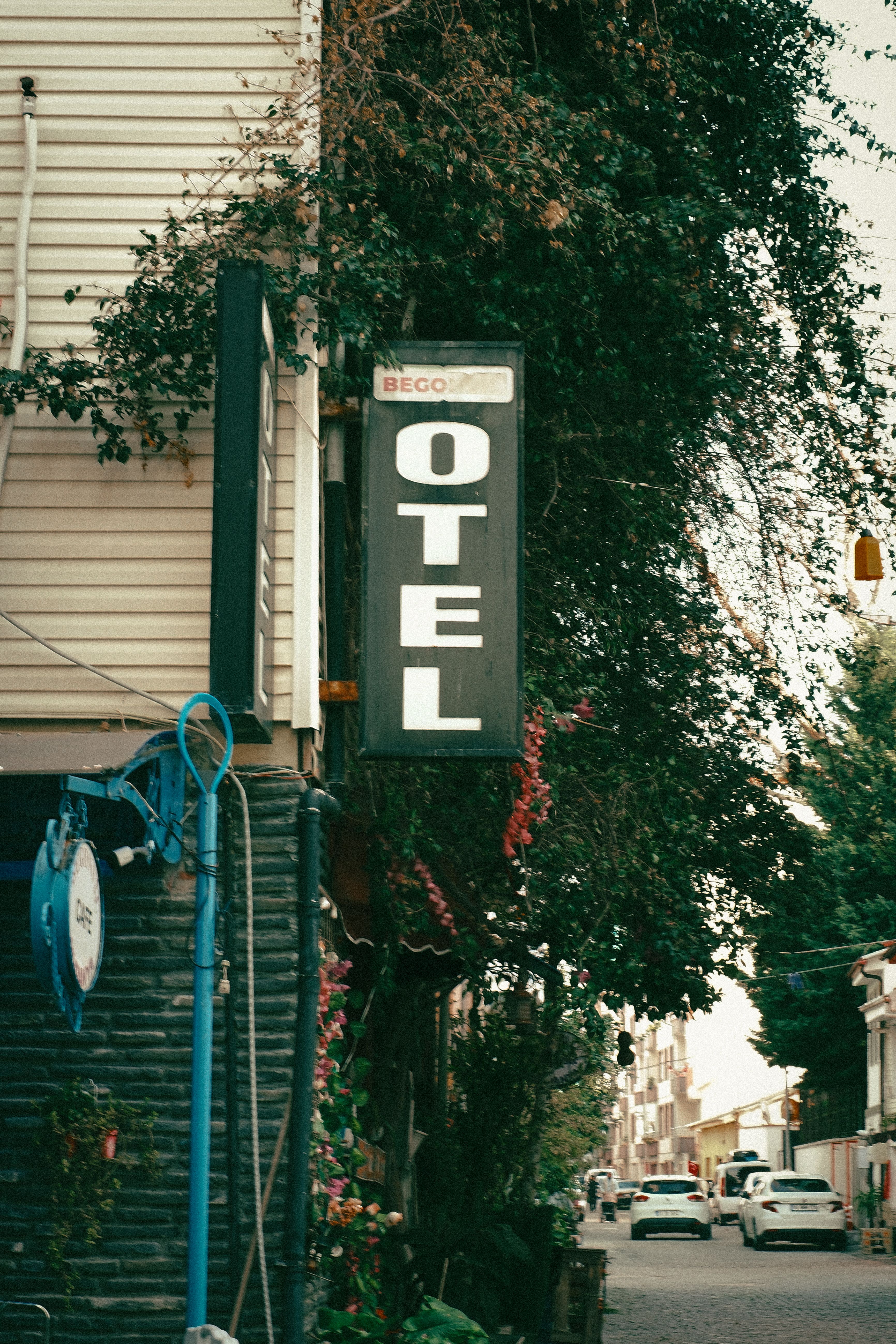 Vintage Hotel Sign on Narrow Street in Bursa · Free Stock Photo