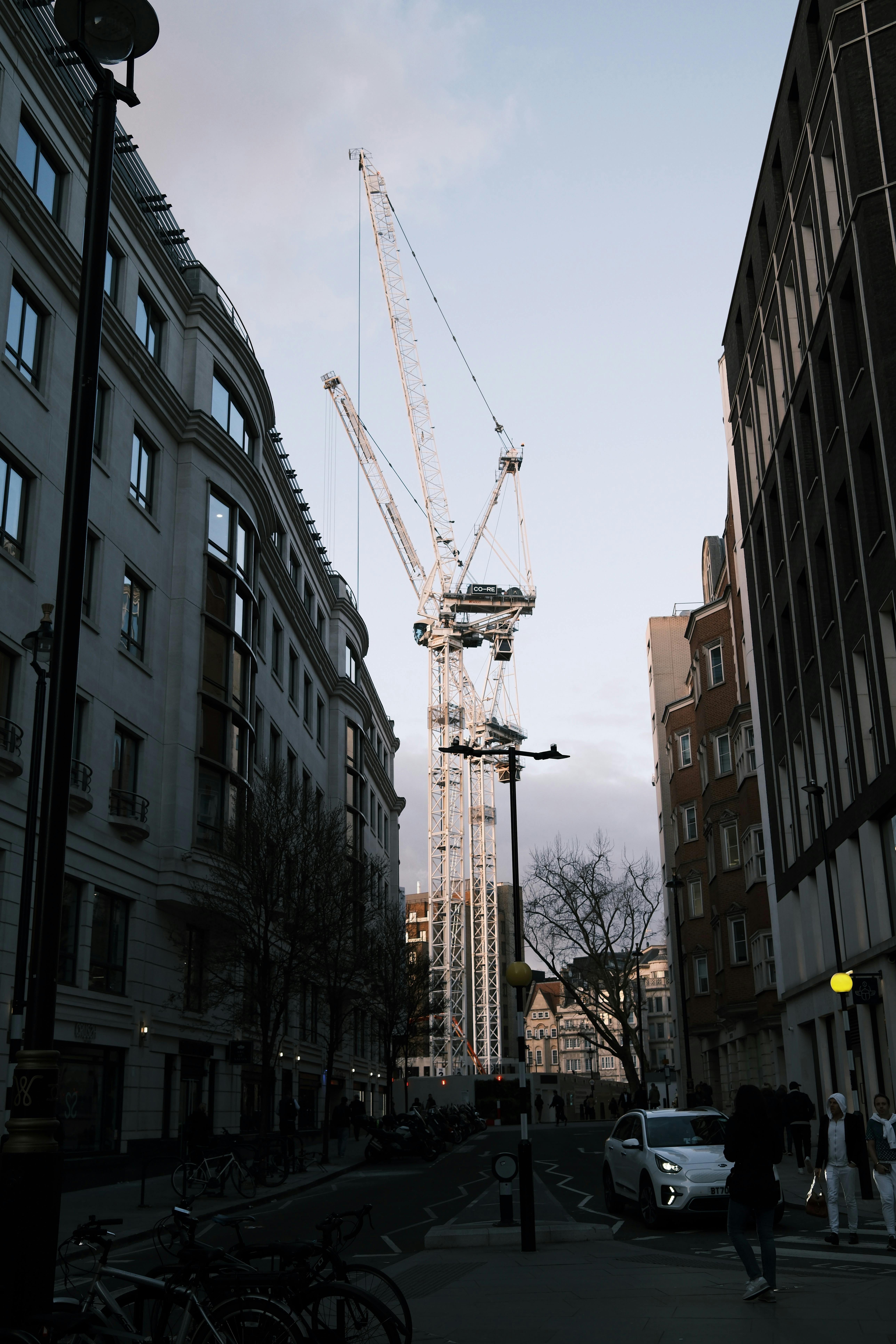Urban Construction Scene with Tower Cranes · Free Stock Photo