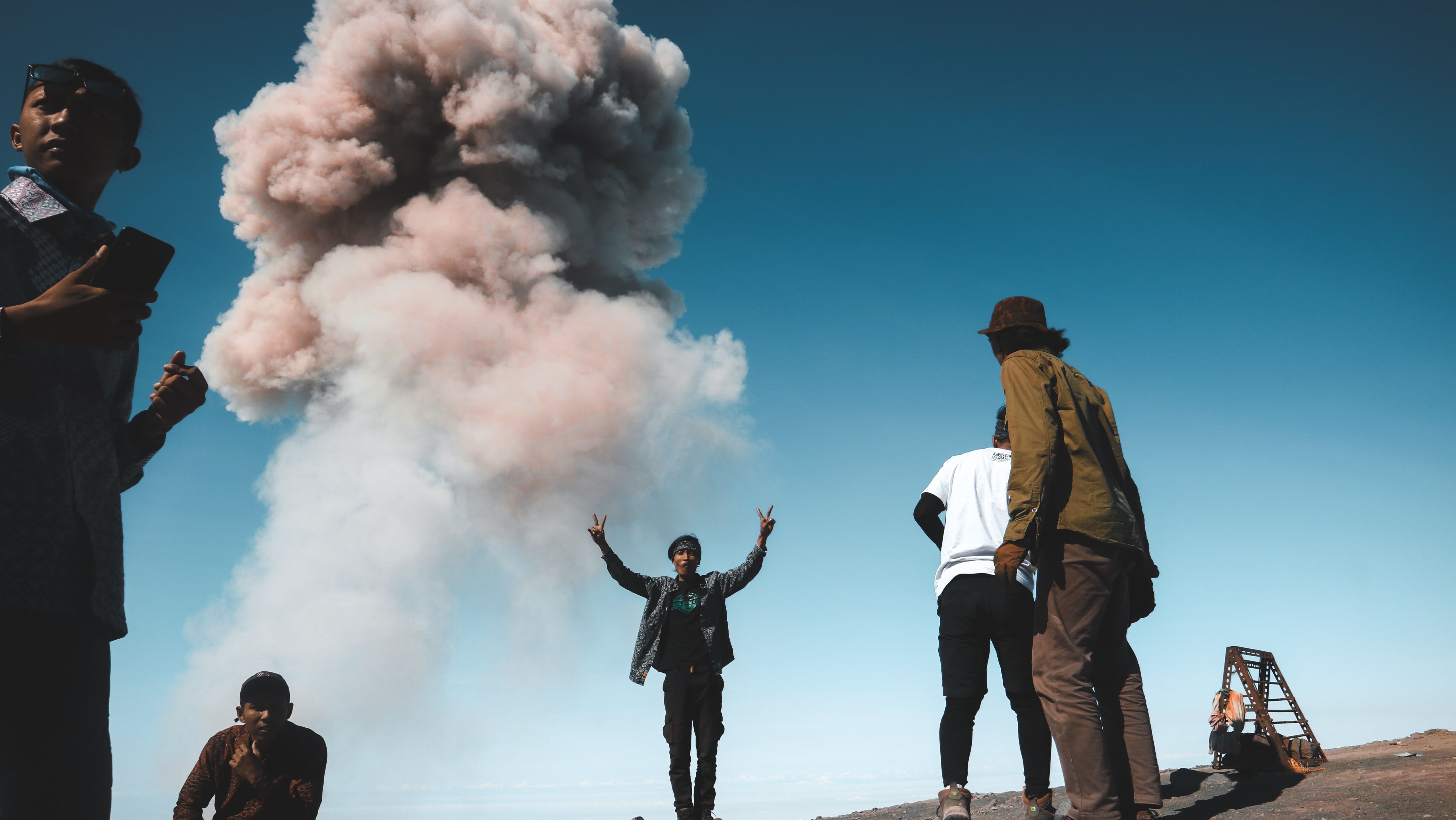 Man Standing Under Smoke · Free Stock Photo